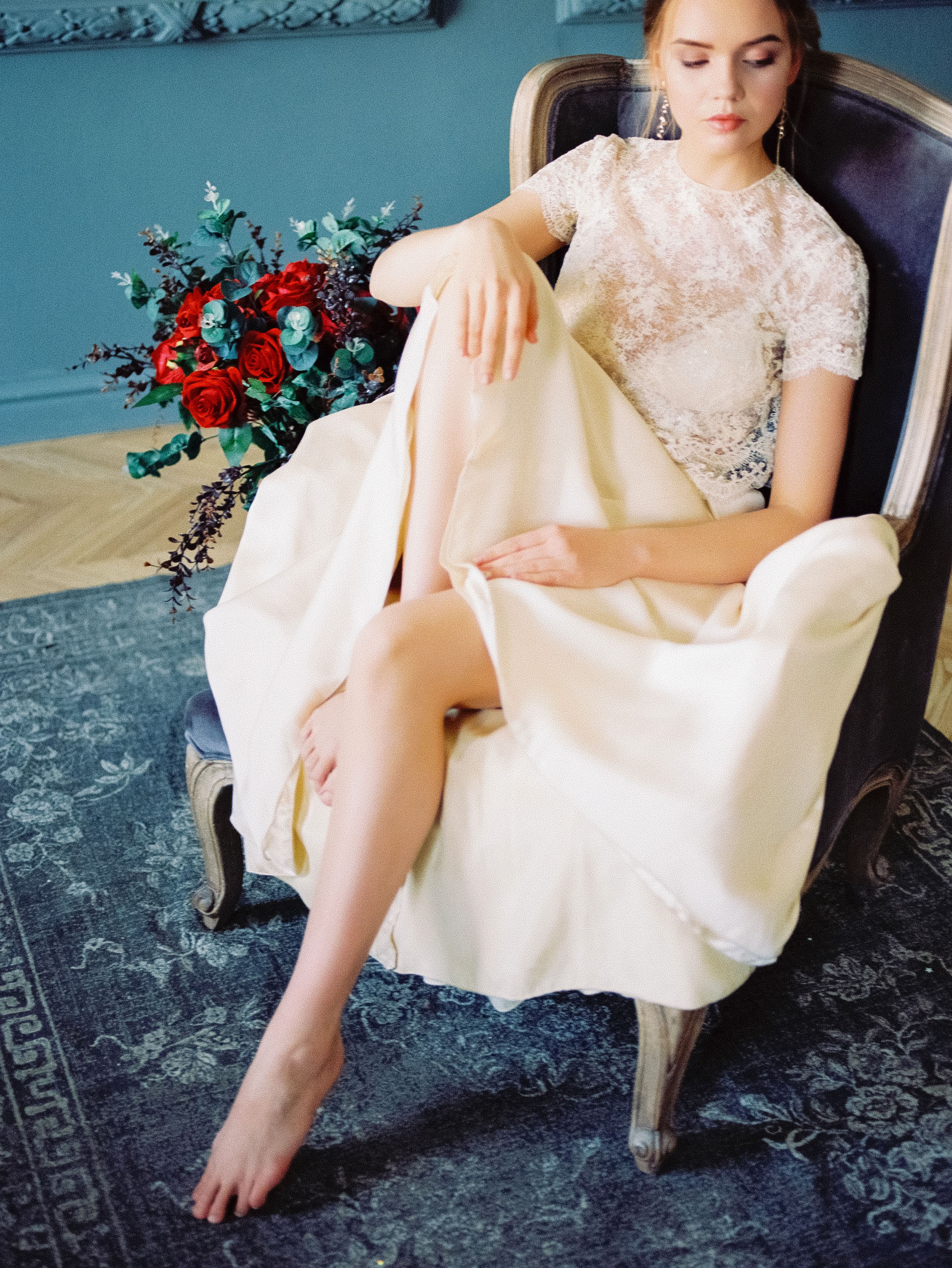 Top View of Woman Sitting with Bouquet of Roses · Free Stock Photo