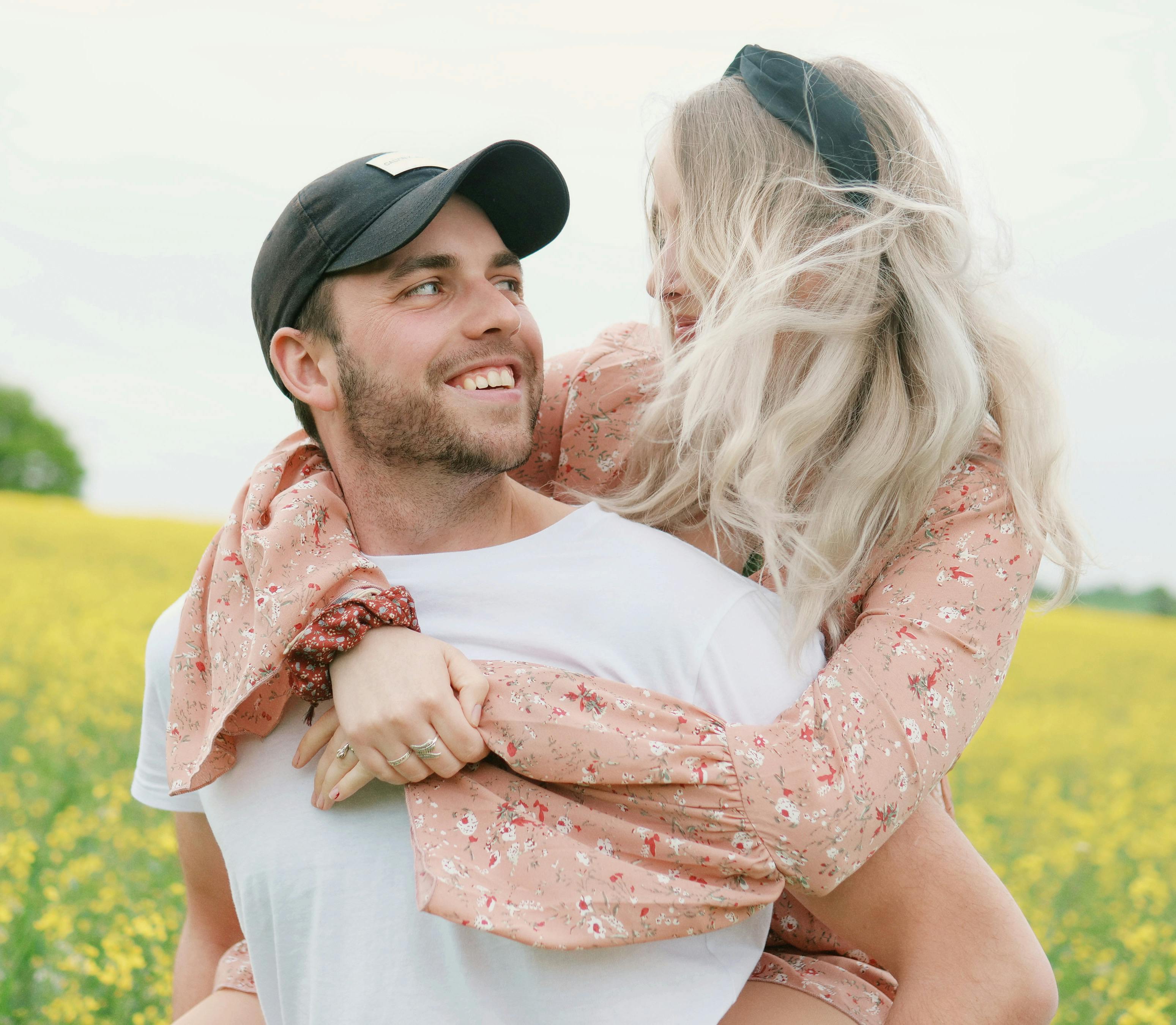 A Romantic Couple Doing a Piggyback Ride · Free Stock Photo