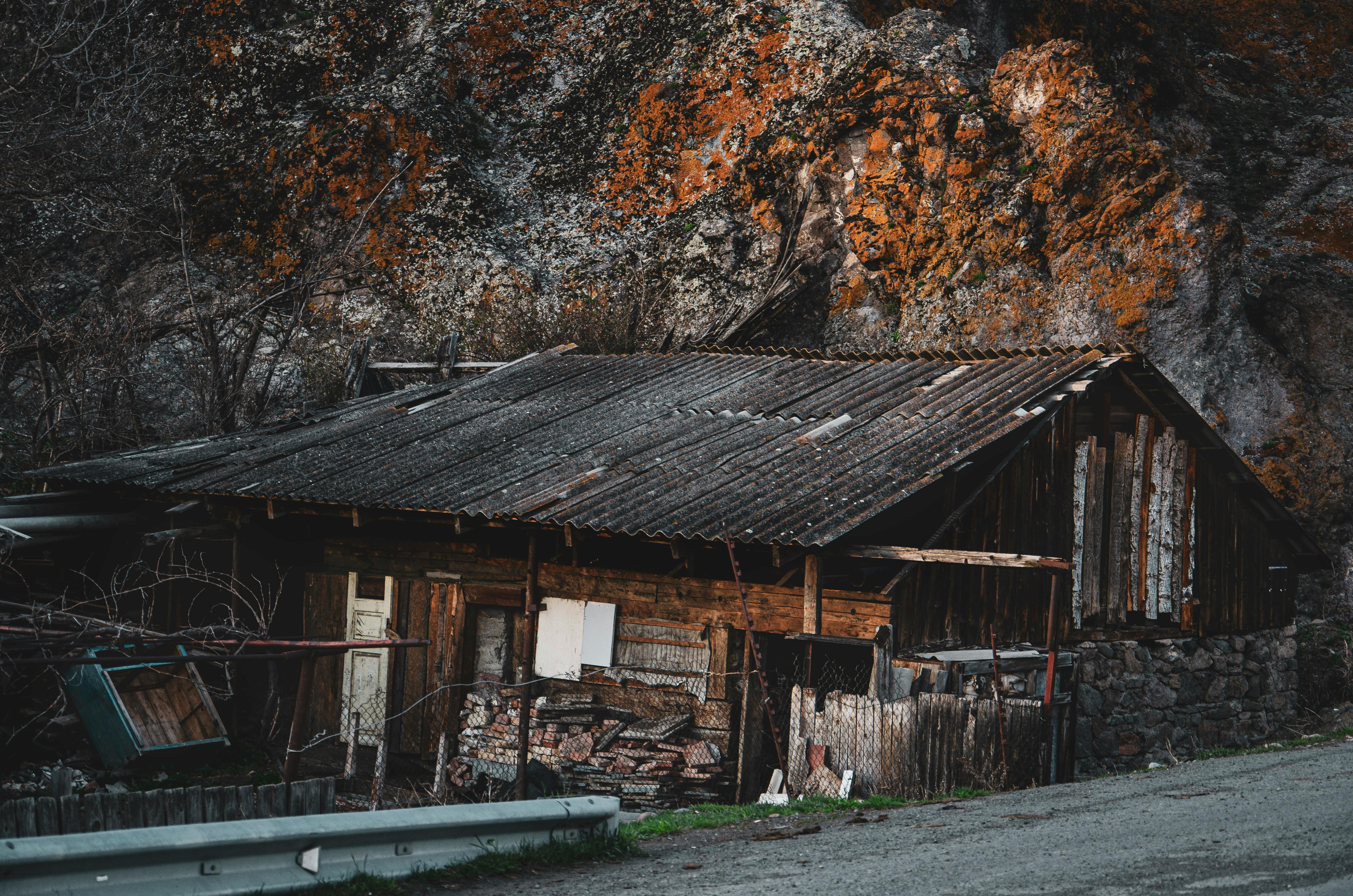 Village Near Mountain Cliff · Free Stock Photo