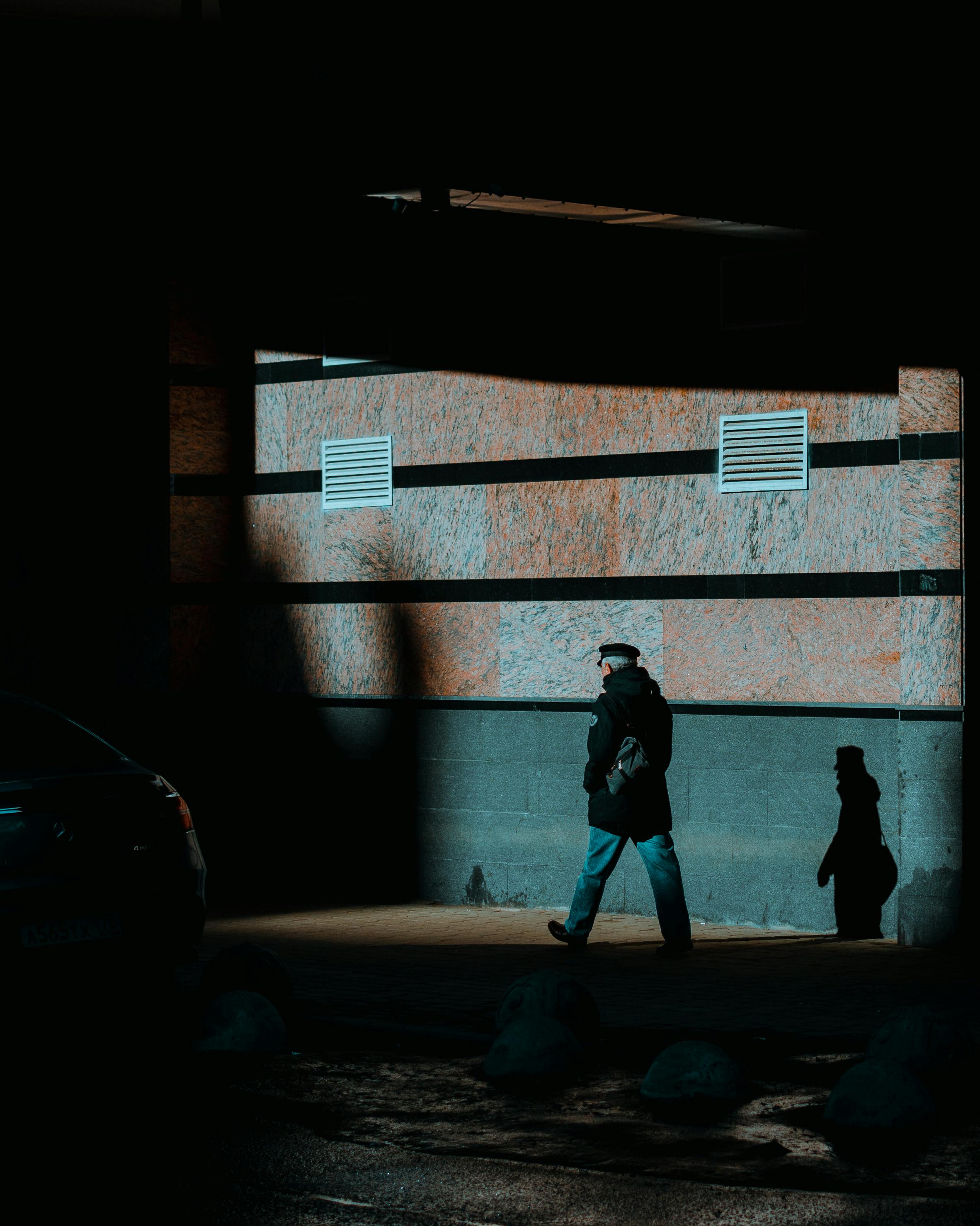 Man Walking on City Street · Free Stock Photo
