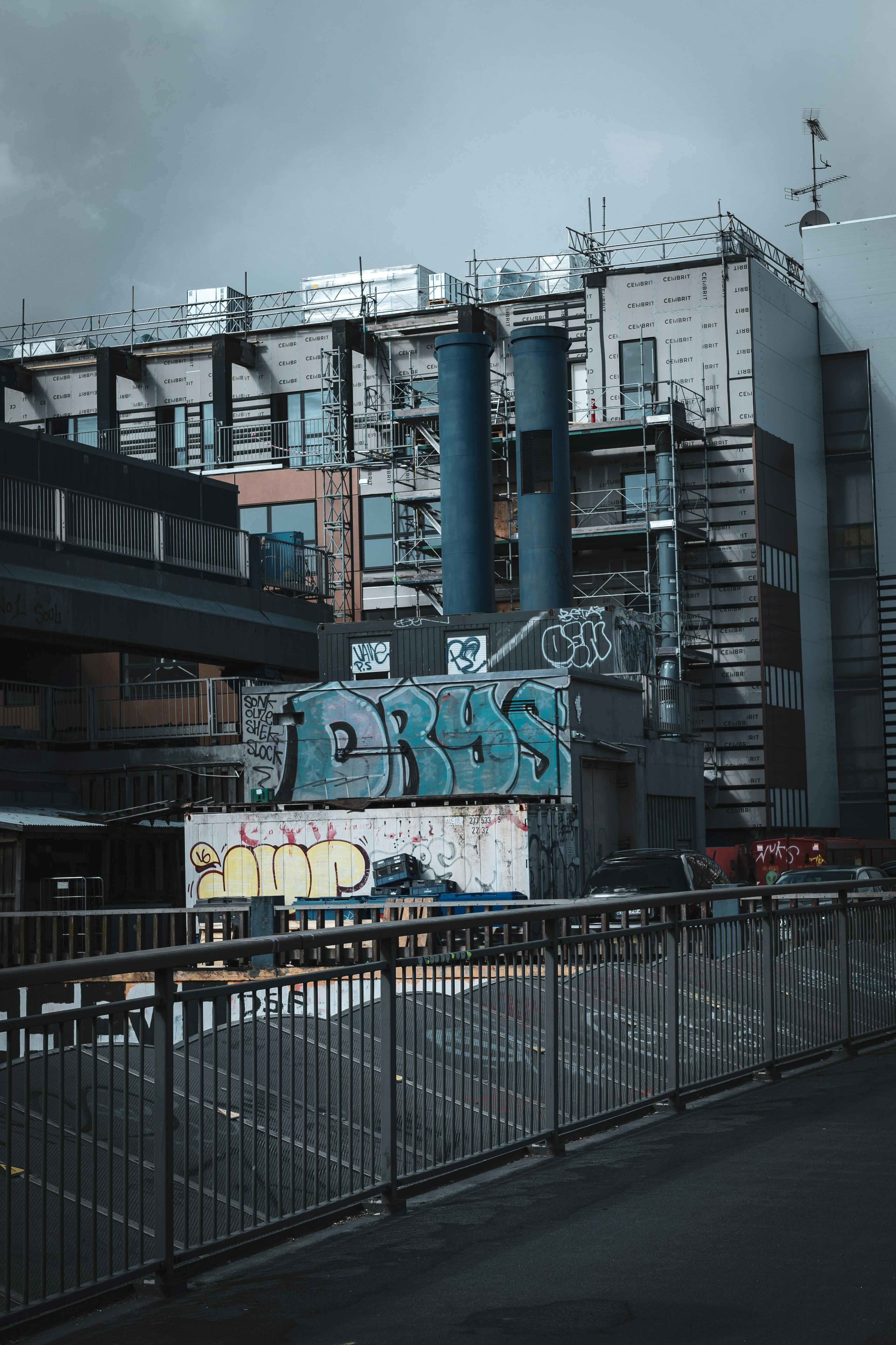 Graffiti on a Wall Outside of a Factory · Free Stock Photo