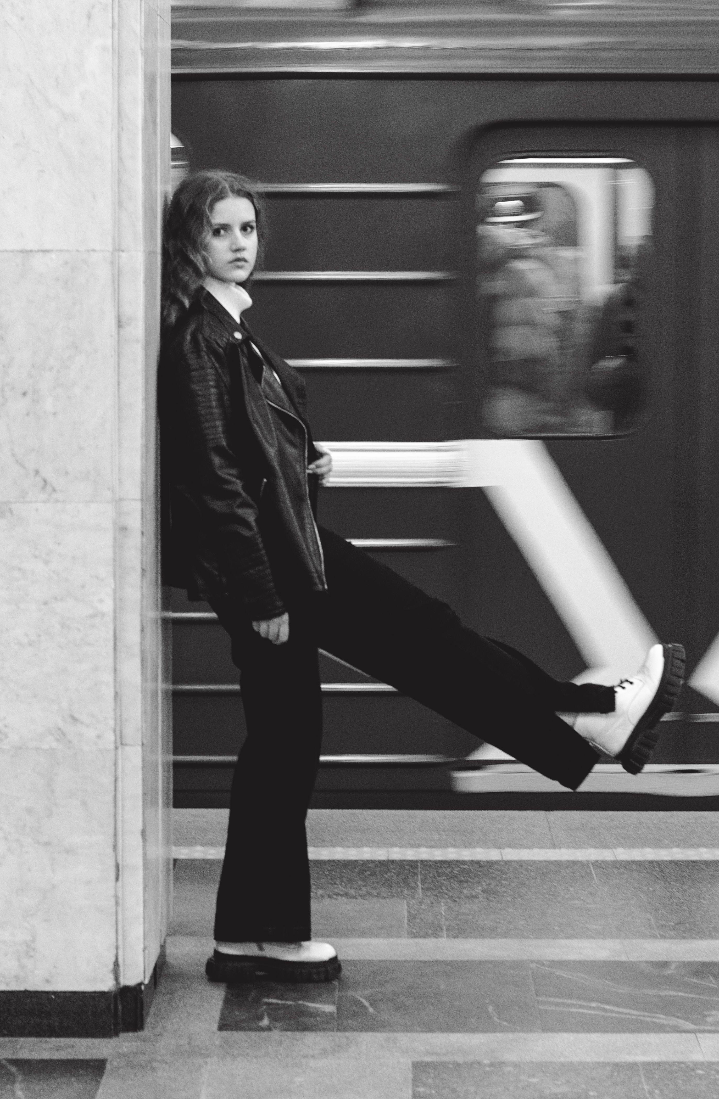Grayscale Photo of a Woman with Her Leg Raised · Free Stock Photo