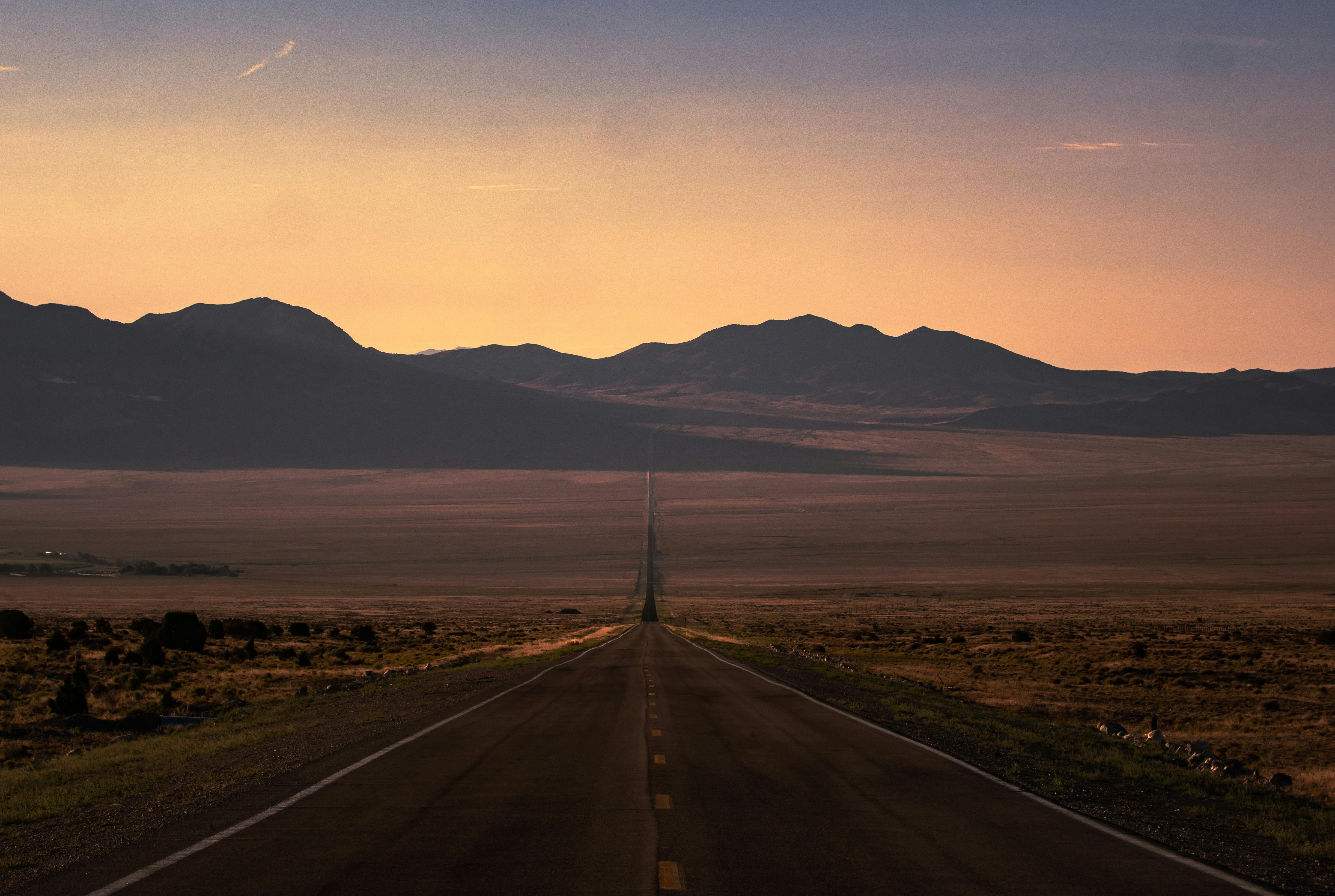 Scenic Landscape with a Road at Sunset · Free Stock Photo