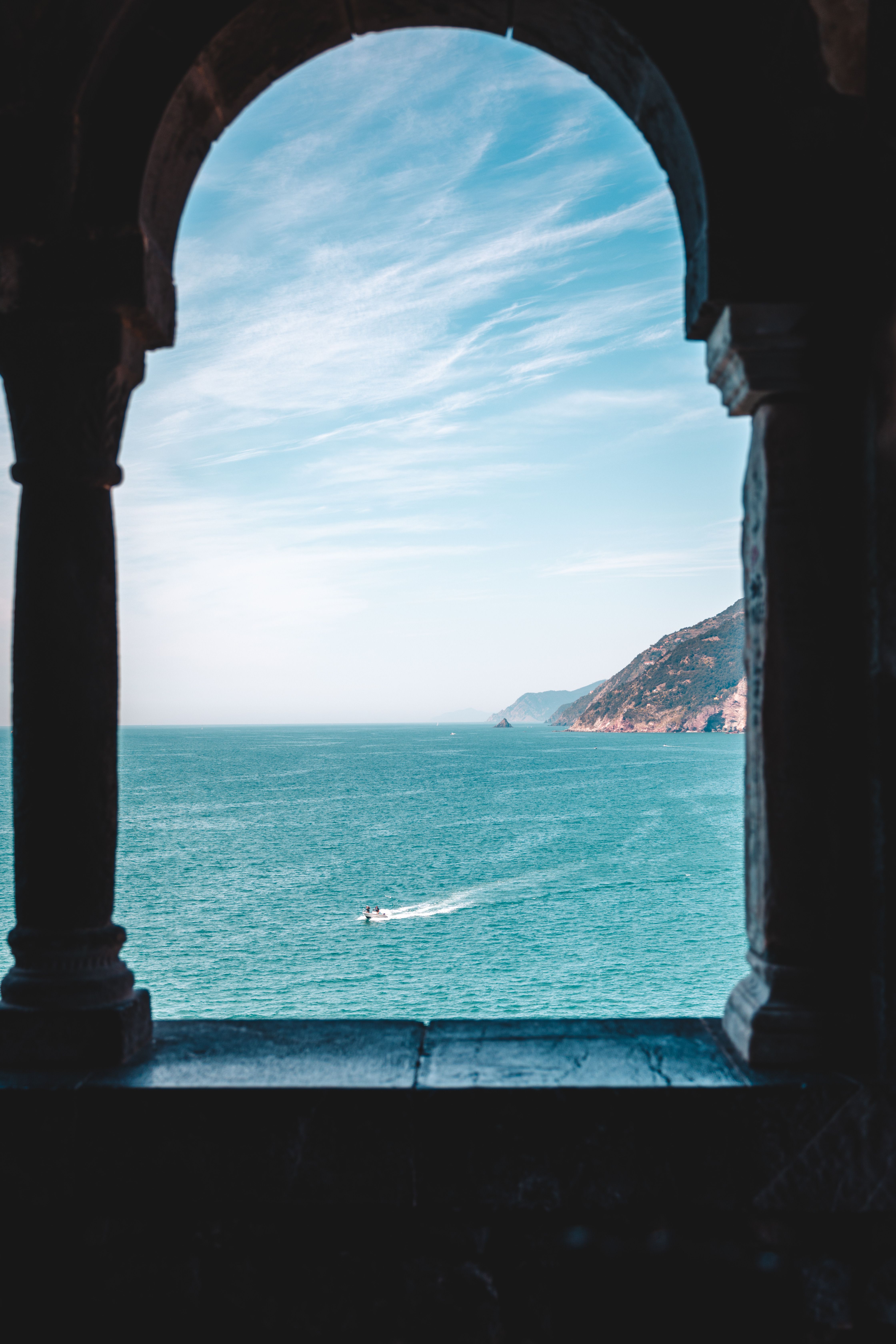 Photo of an Arch Near a Ocean · Free Stock Photo