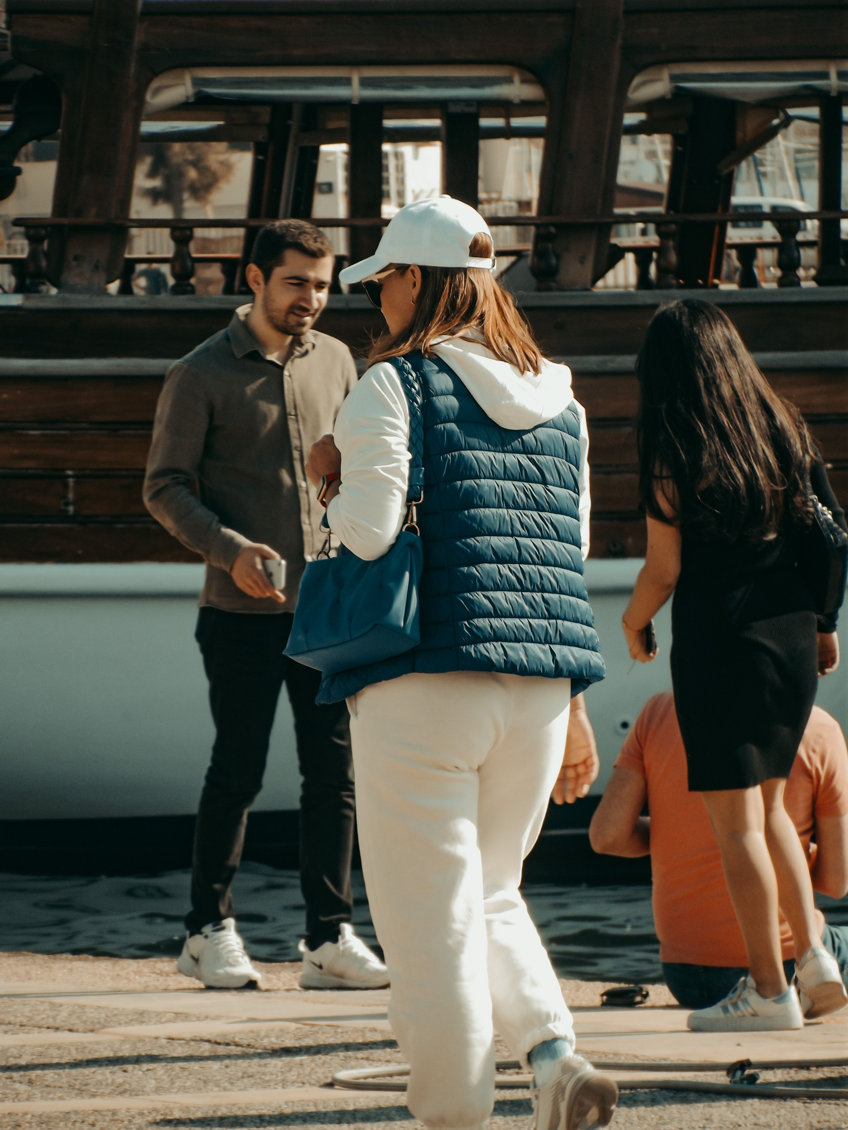 People Walking on a Harbor · Free Stock Photo