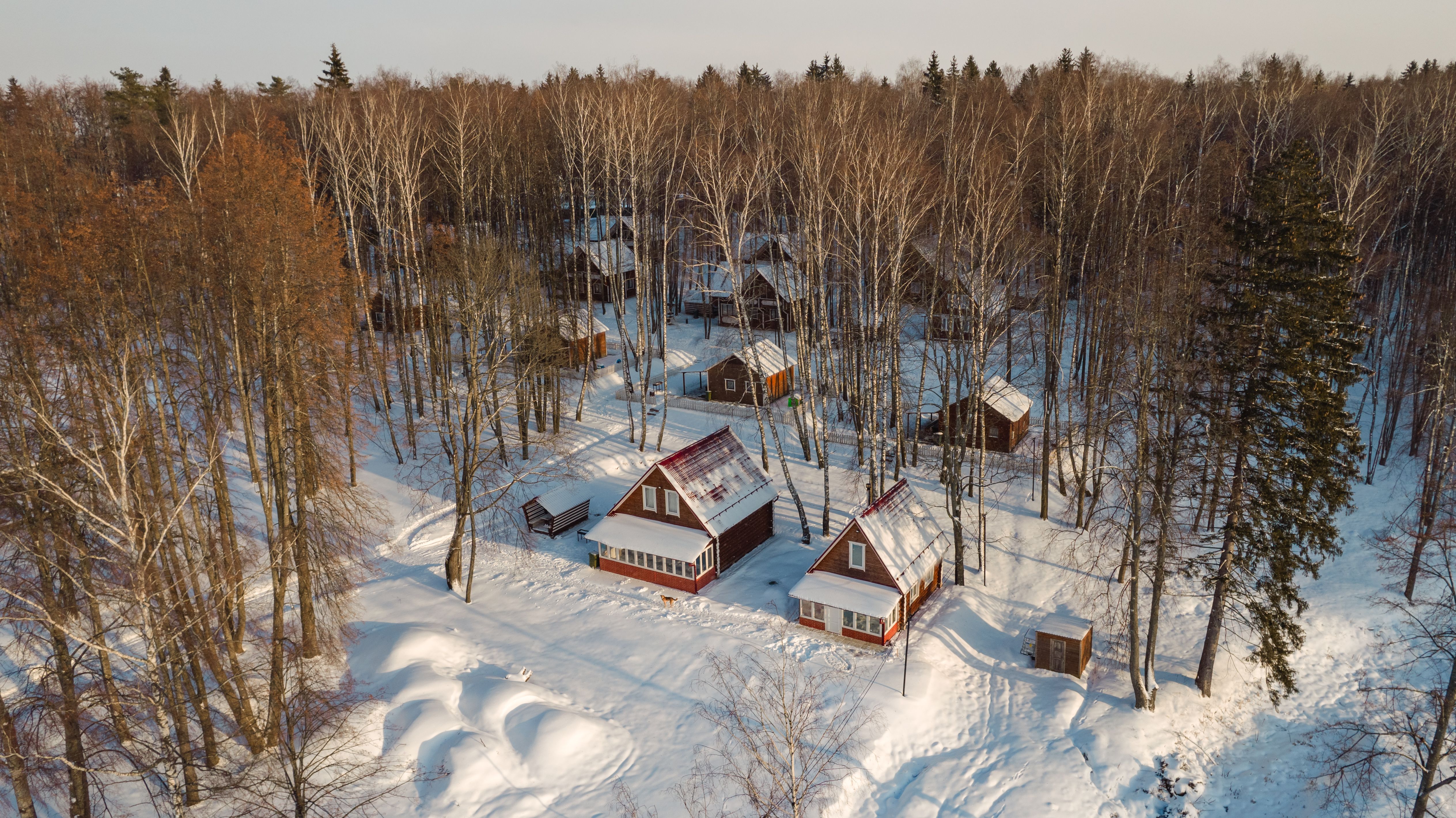 Aerial View of Houses on Snow Covered Ground · Free Stock Photo