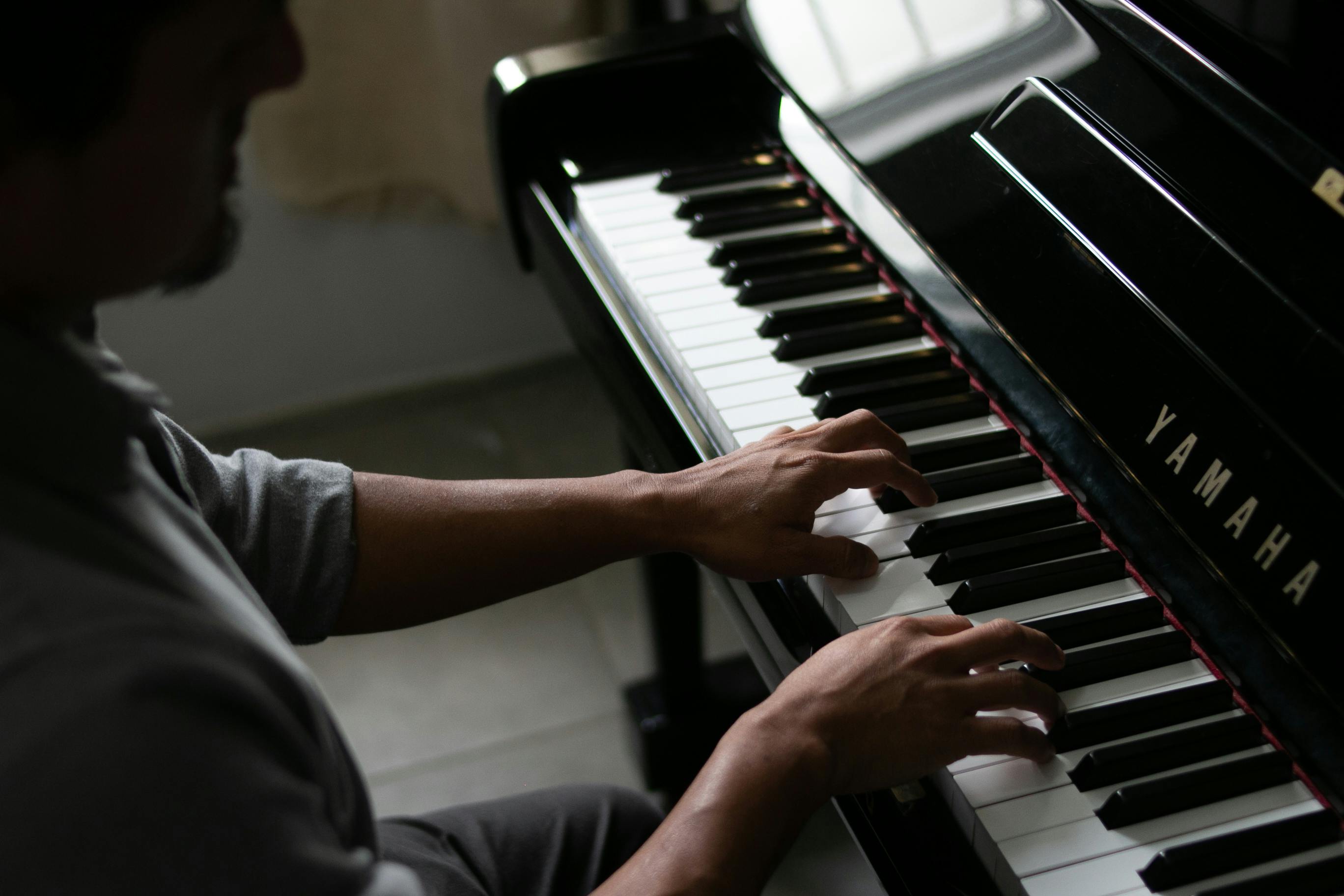 A Person Playing the Piano · Free Stock Photo