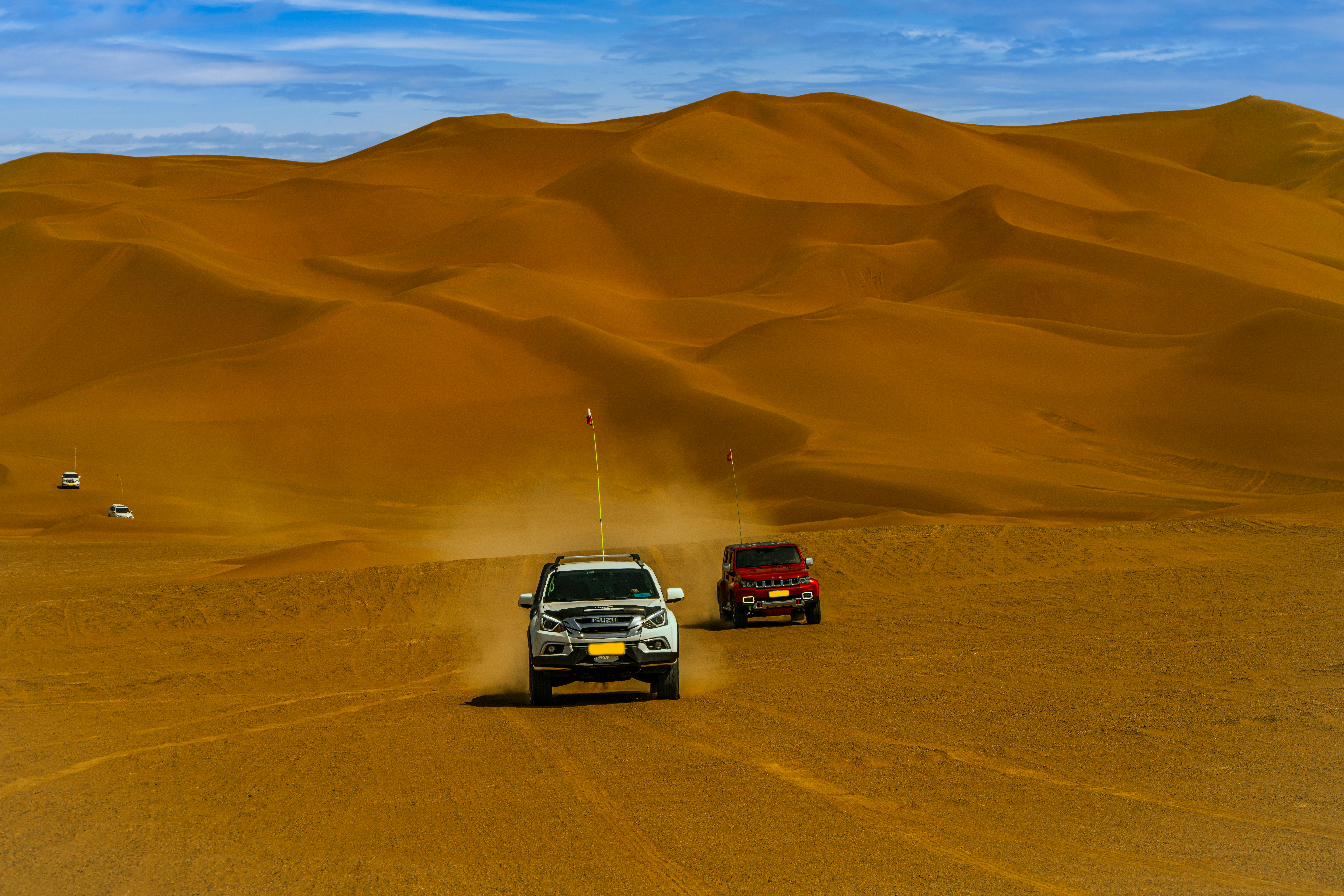 Cars Racing on a Desert · Free Stock Photo