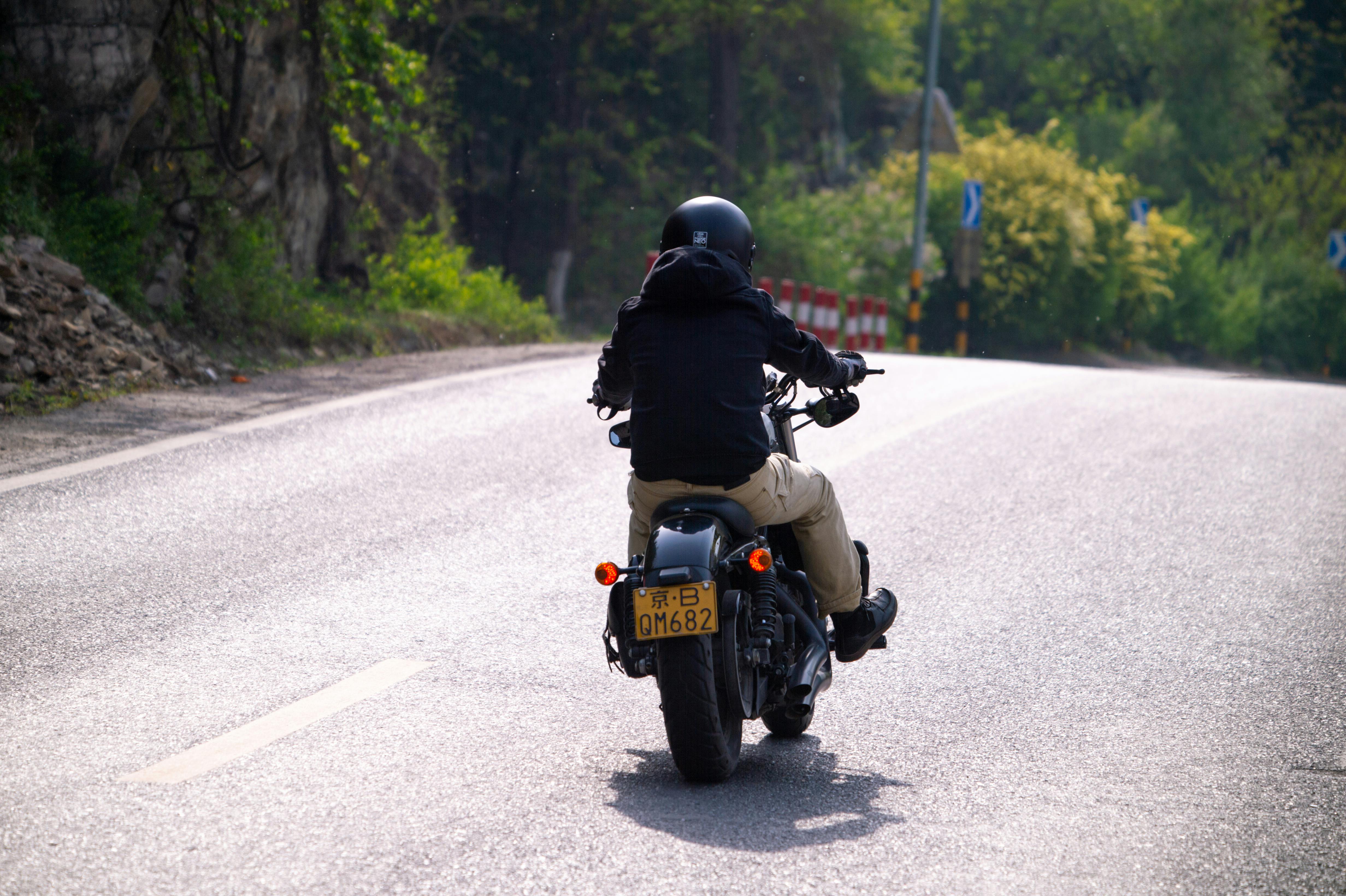 A Person Riding a Motorcycle · Free Stock Photo