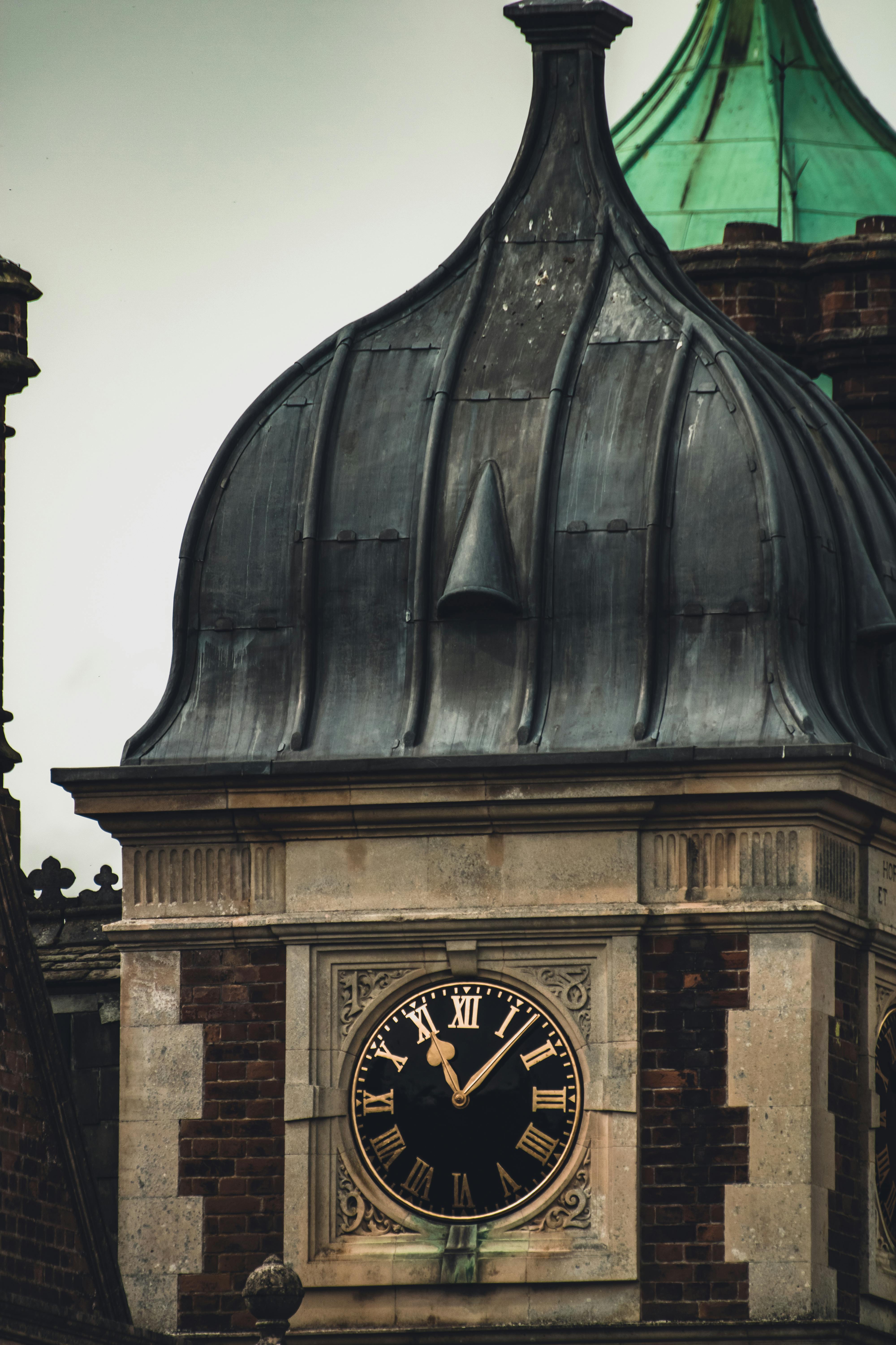 A Concrete Clock Tower · Free Stock Photo