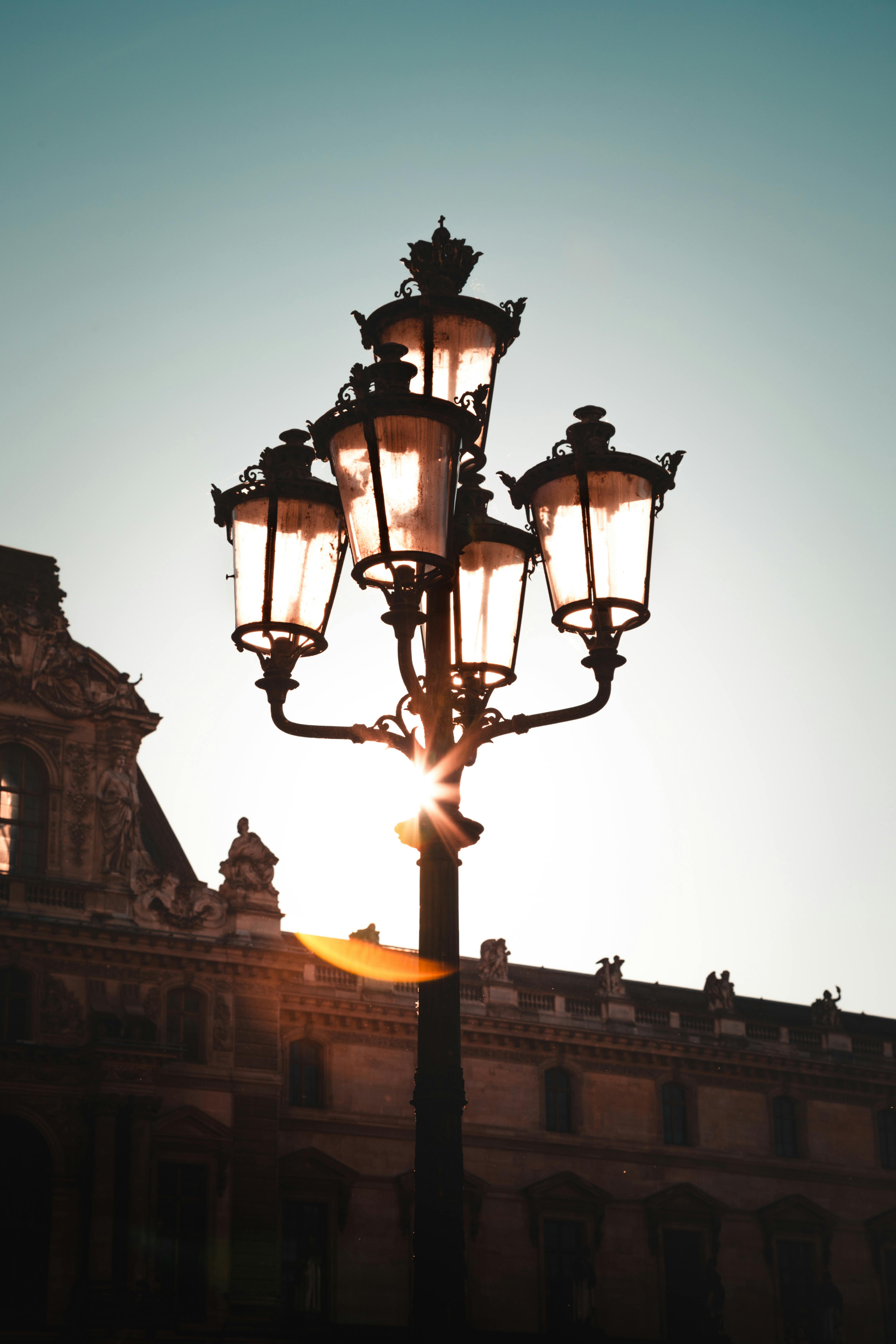 Photograph of a Street Lamp Near a Building · Free Stock Photo