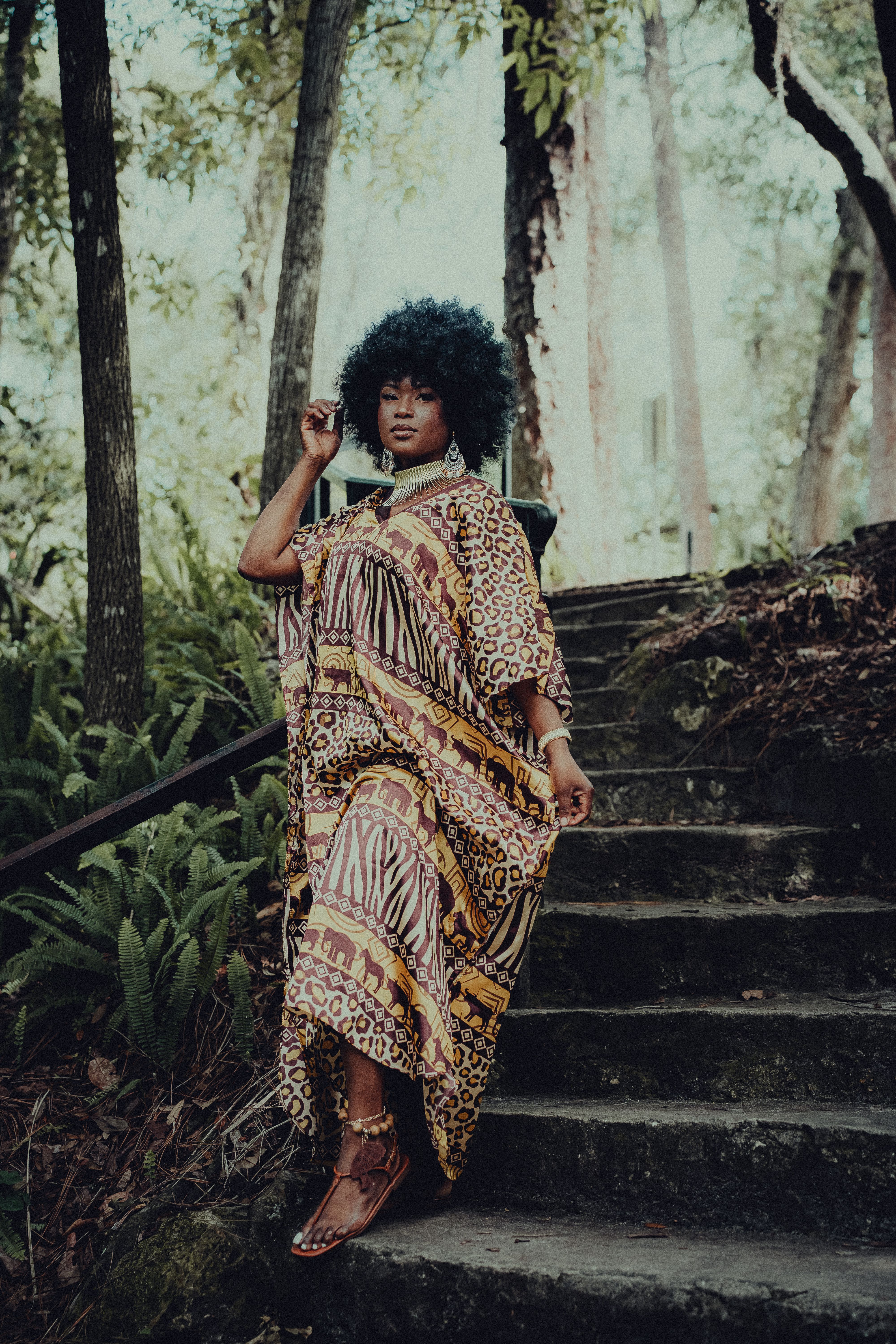 Woman in Patterned Dress · Free Stock Photo