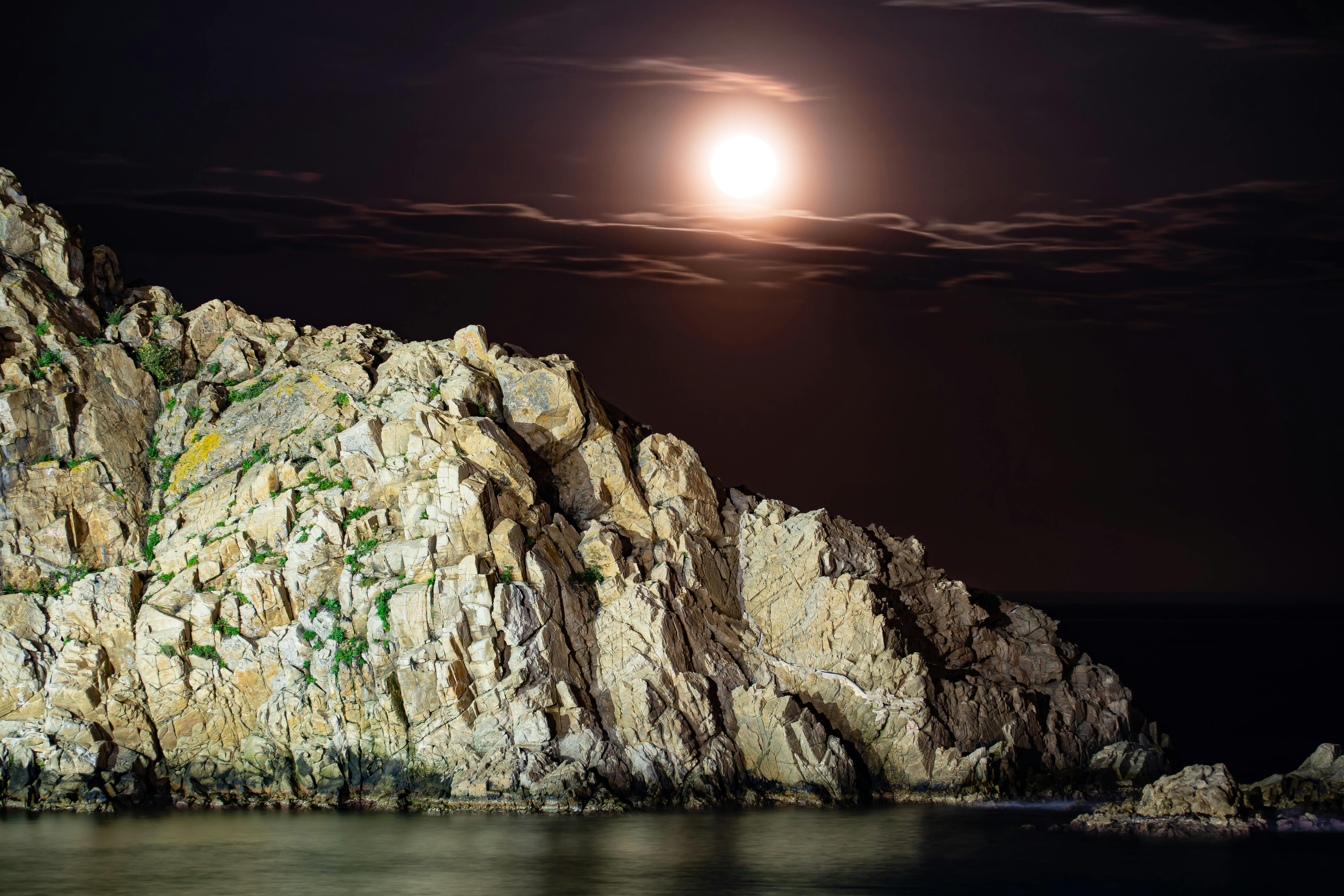Moon Over Rocks · Free Stock Photo
