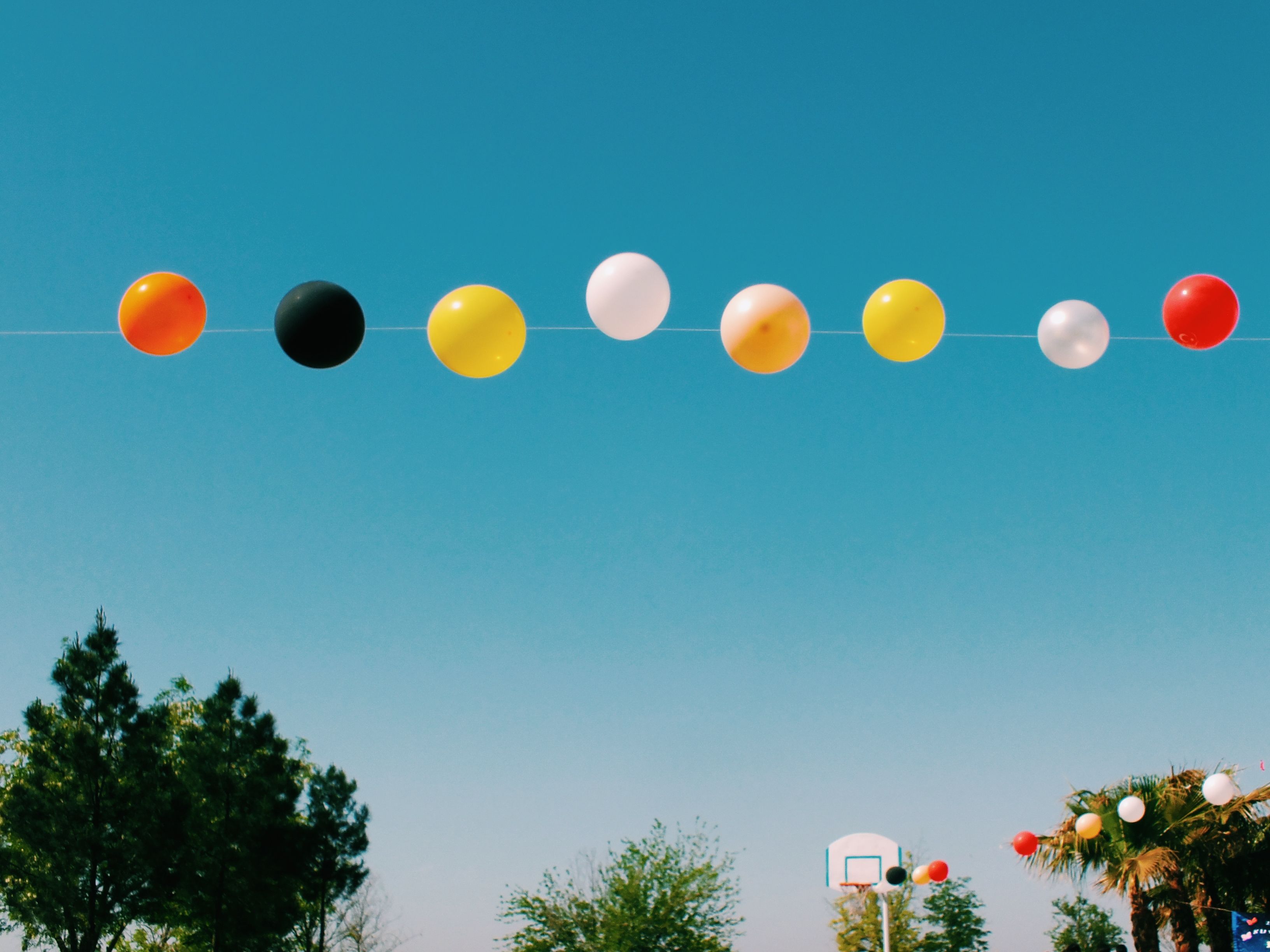 Balloons Tied on a String · Free Stock Photo
