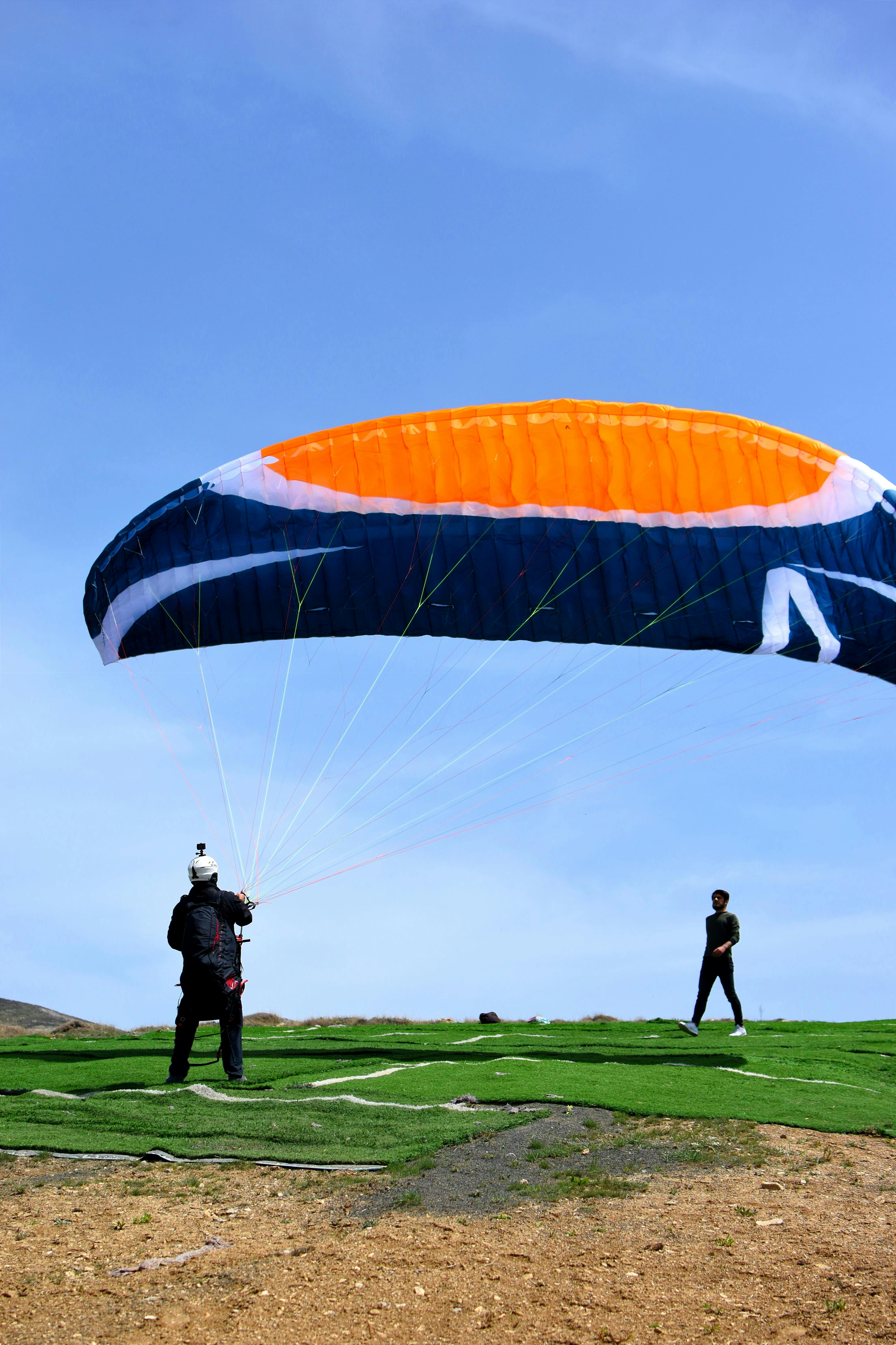 Man with Paraglider · Free Stock Photo
