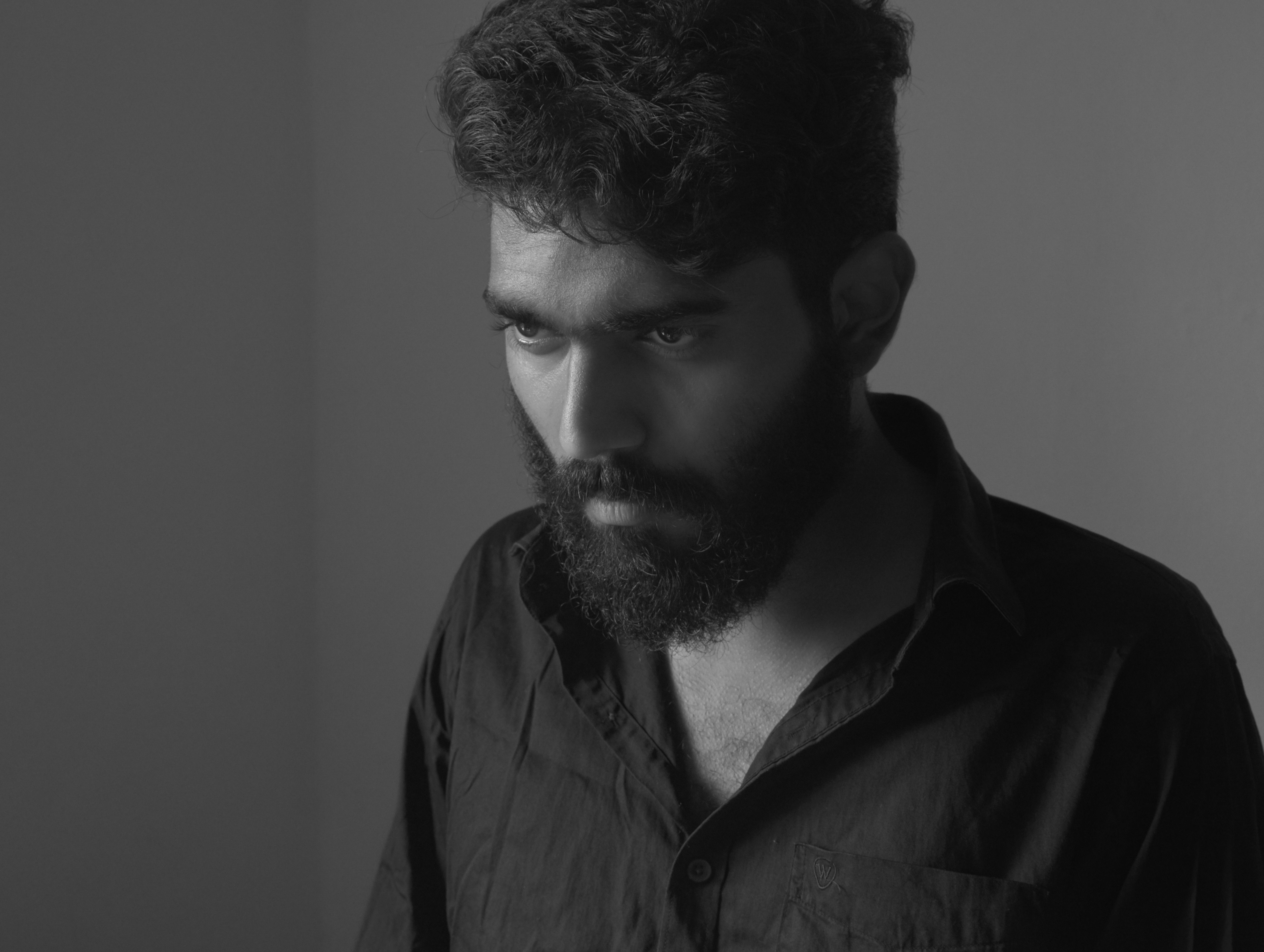 Grayscale Portrait of a Bearded Man · Free Stock Photo