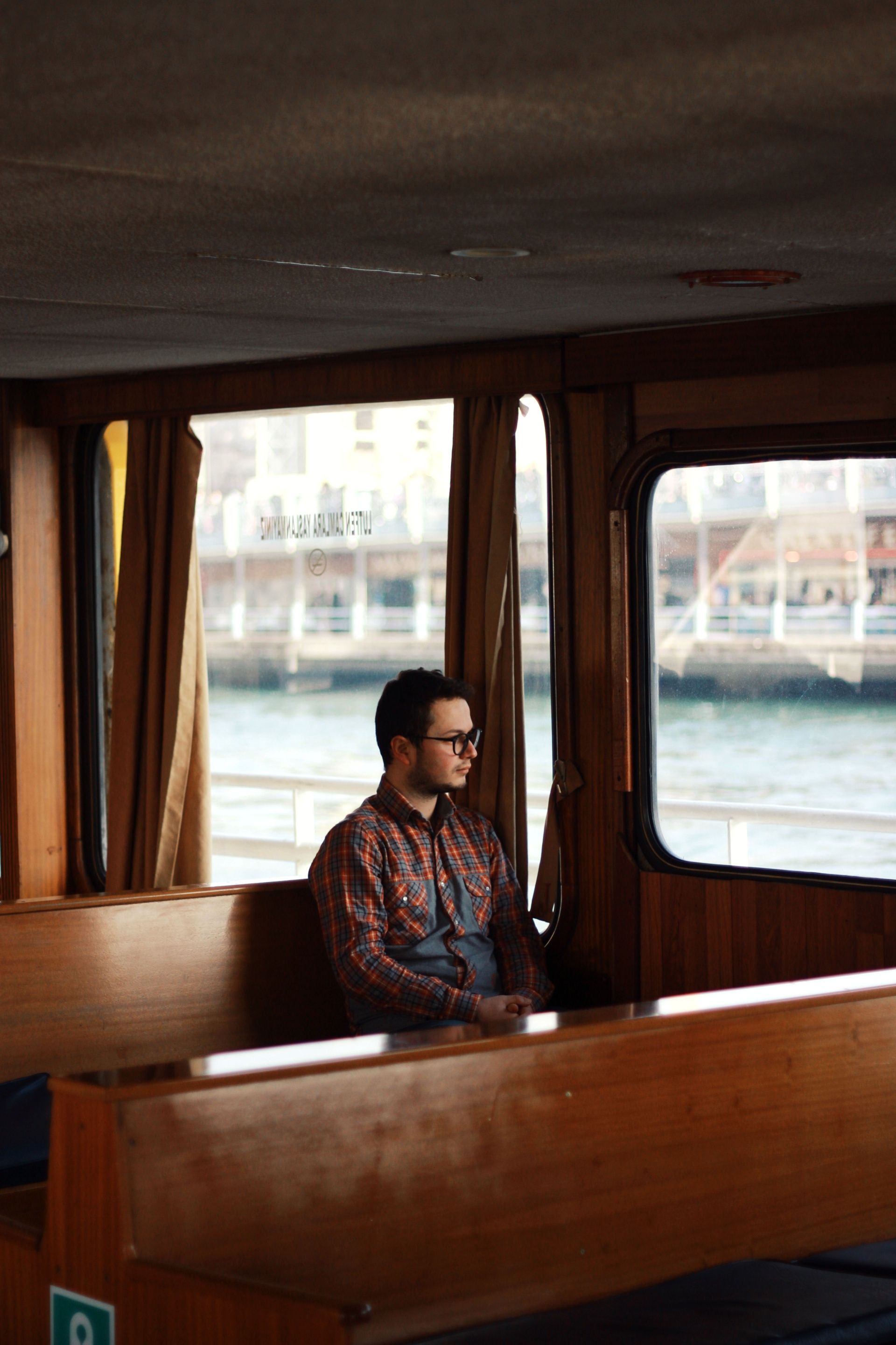 Man Travelling on a Ferry · Free Stock Photo