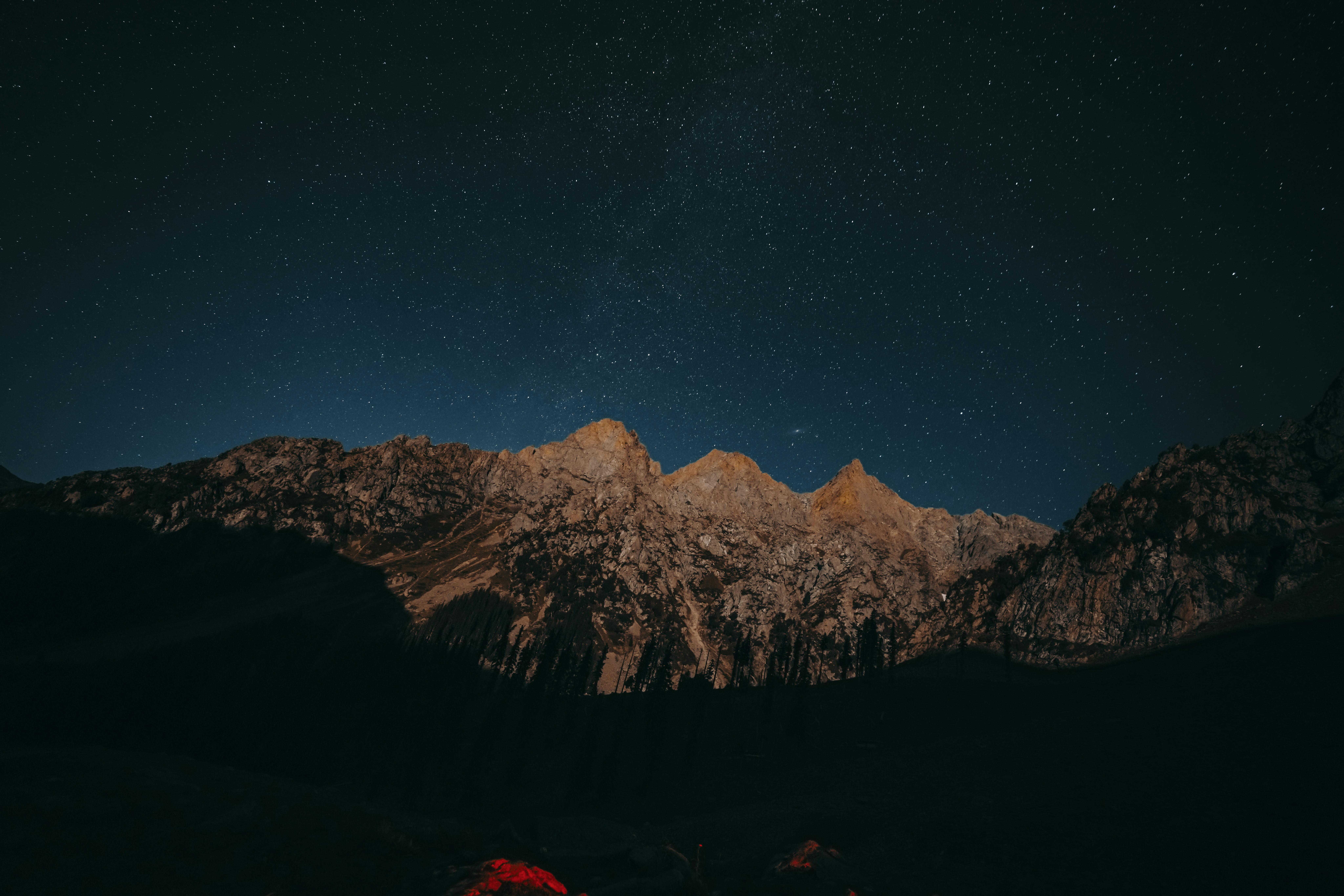 Scenic View of a Rocky Mountain at Night · Free Stock Photo