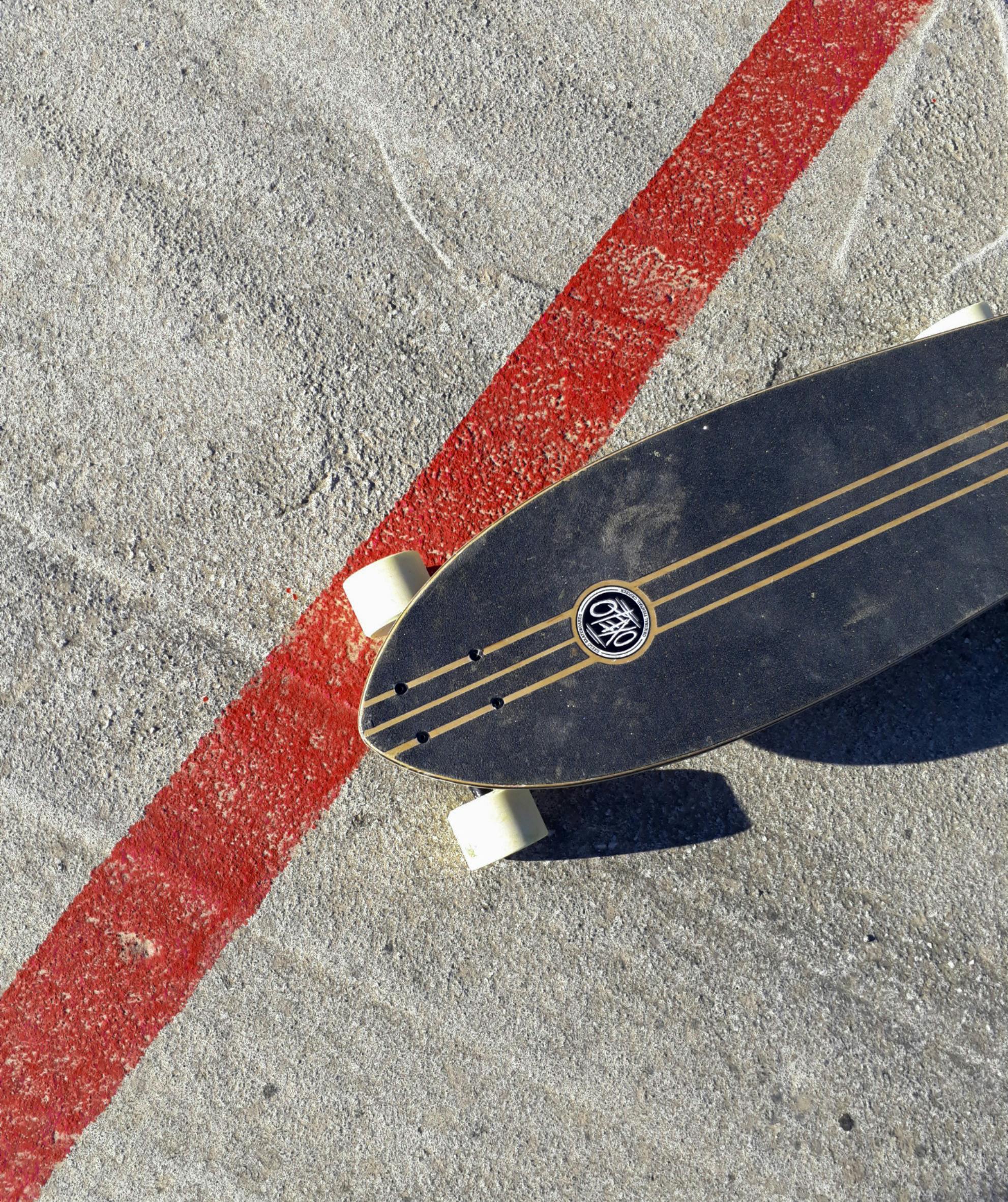 Red and Black Skateboard on Gray Concrete Floor · Free Stock Photo
