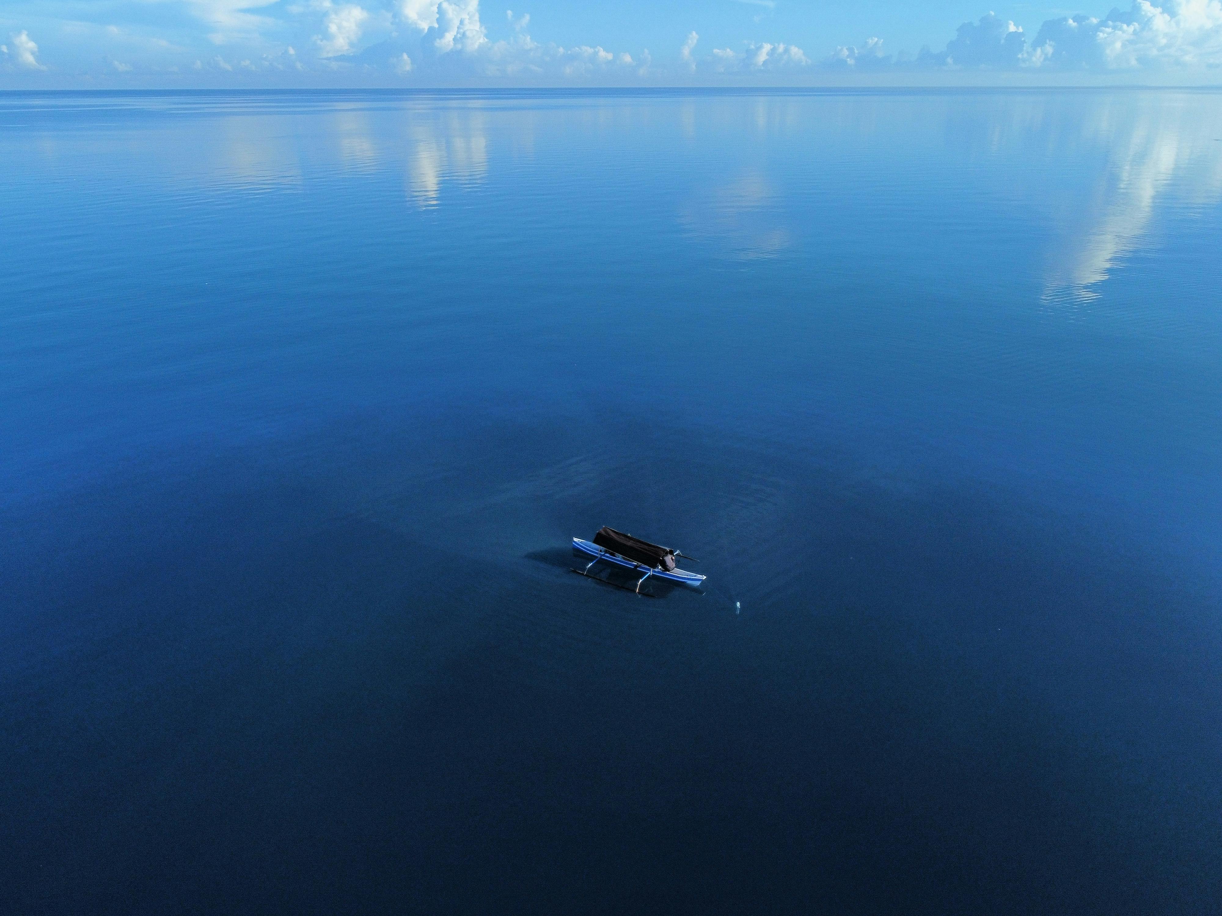 Drone Shot of a Boat at Sea · Free Stock Photo