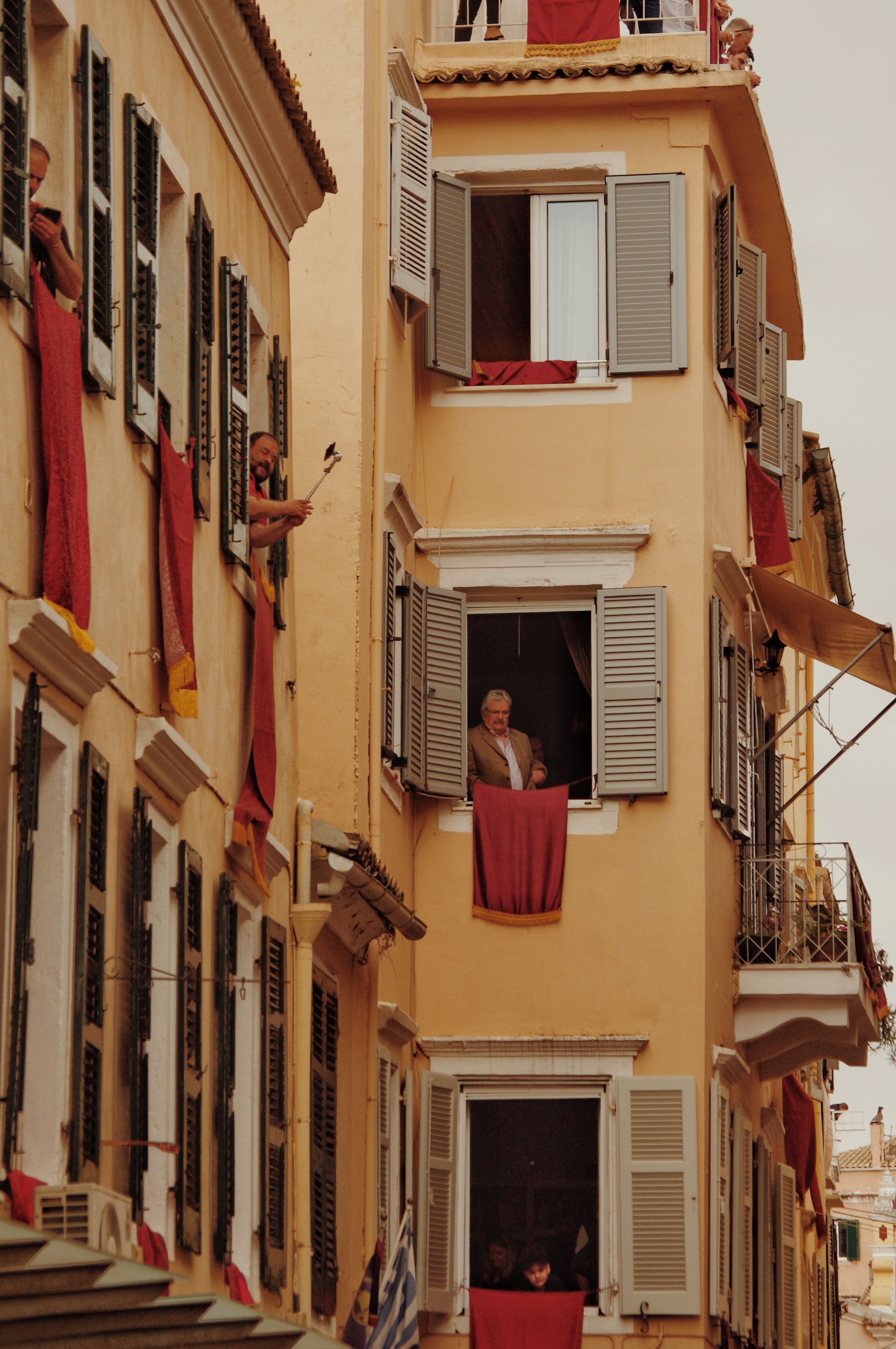 People Looking Outside Their Windows · Free Stock Photo