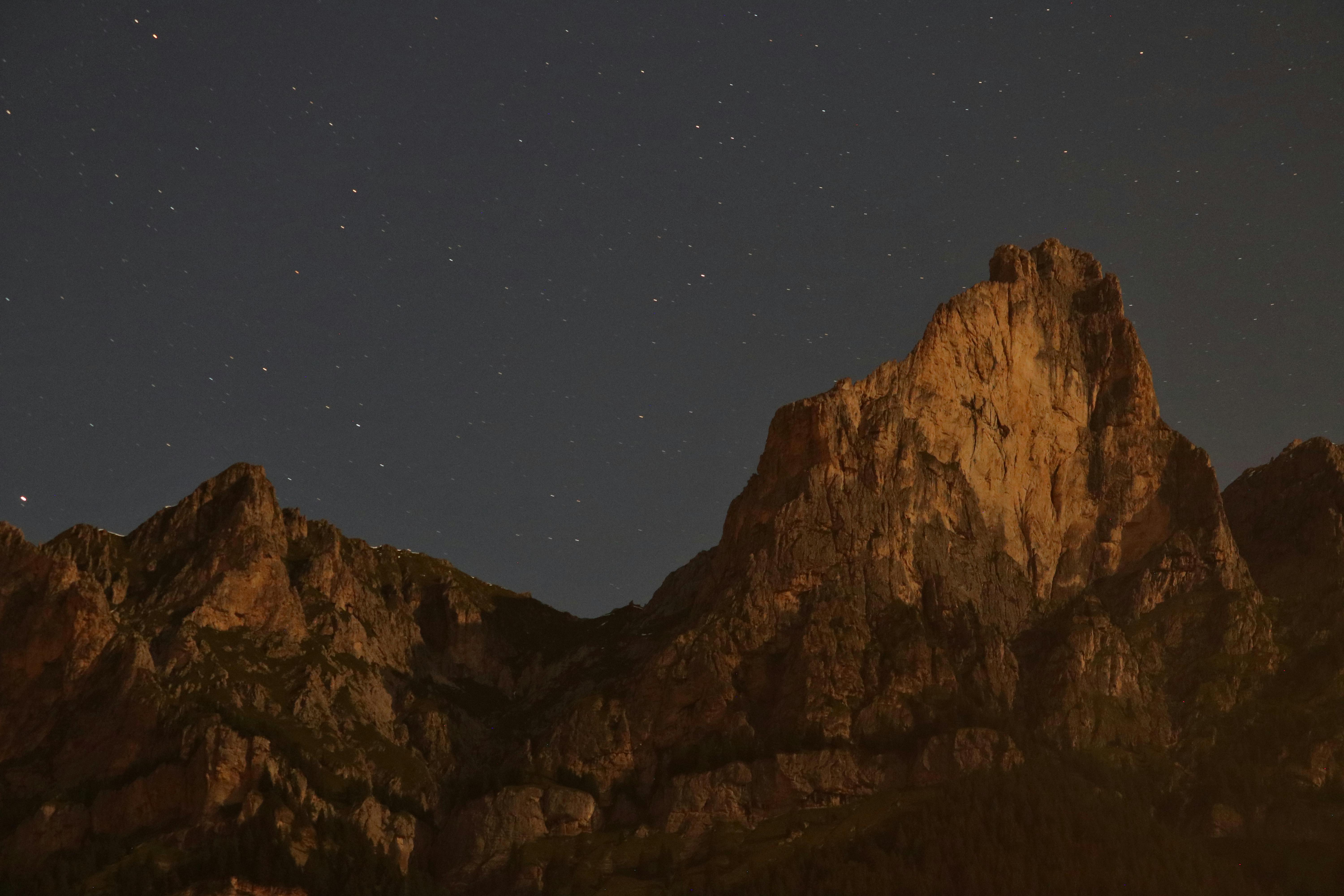 Brown Rock Mountains Under the Starry Night · Free Stock Photo