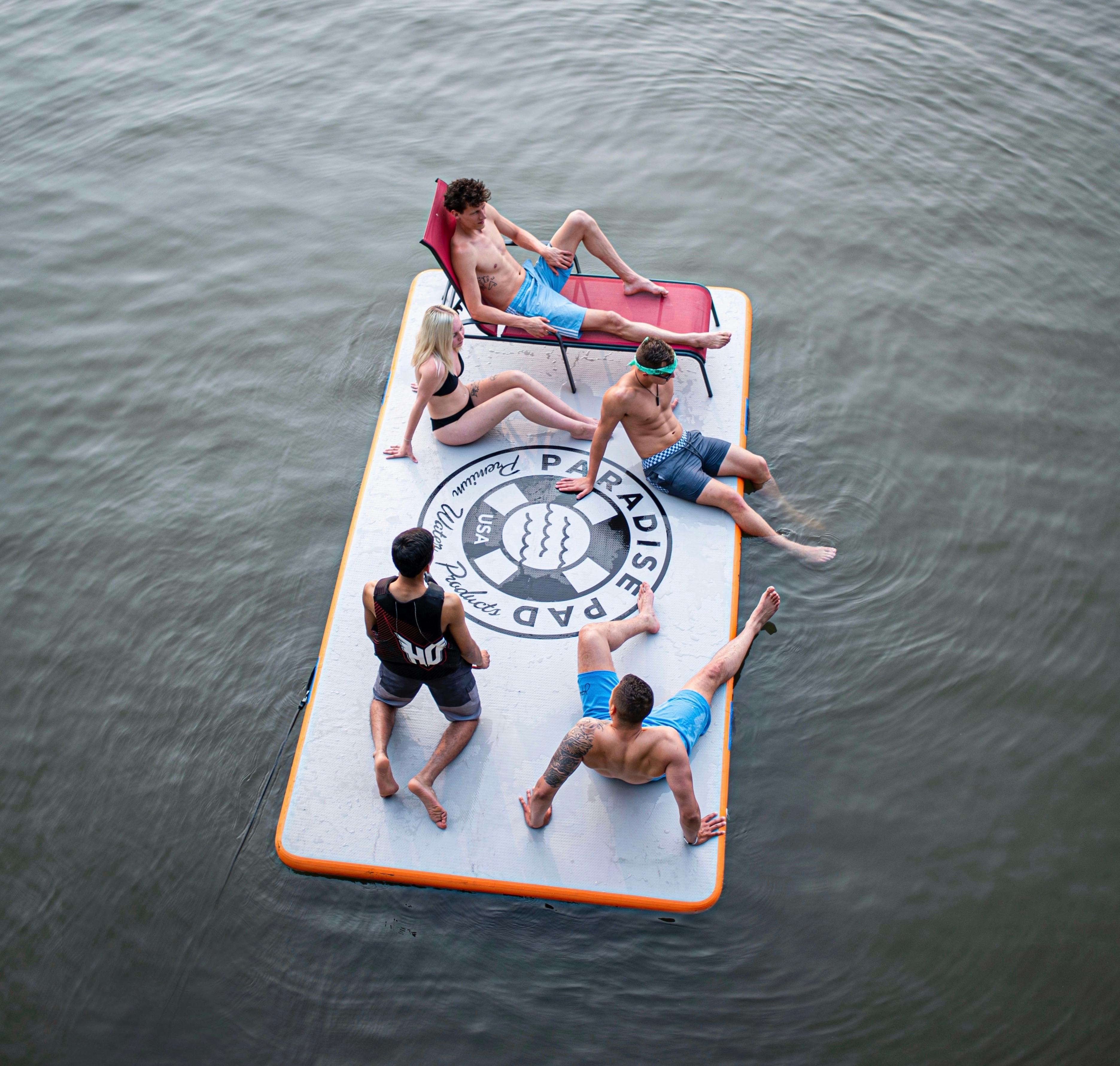 Birds Eye View of People on a Floating Mat · Free Stock Photo