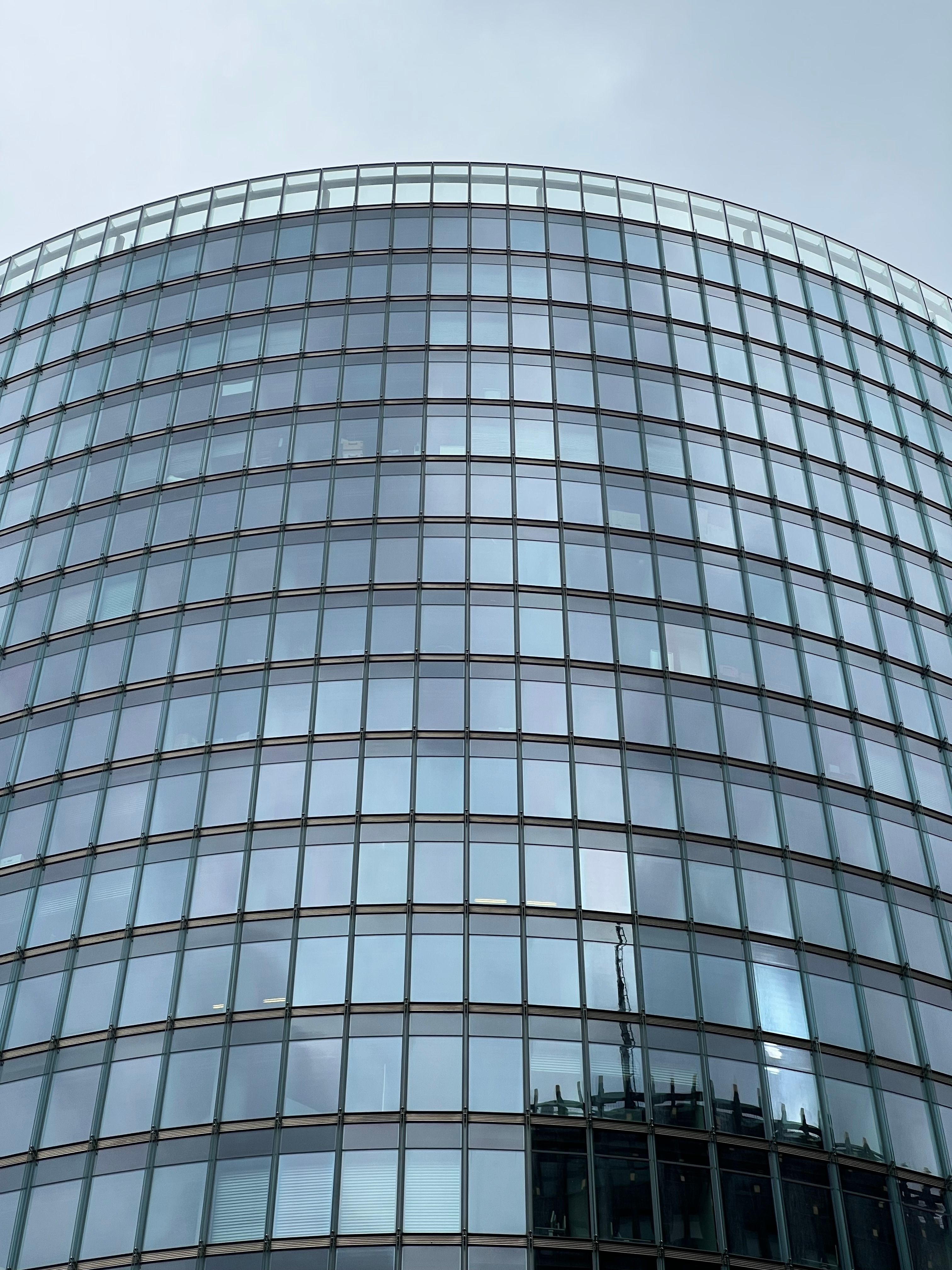 Glass Building Under Cloudy Sky · Free Stock Photo