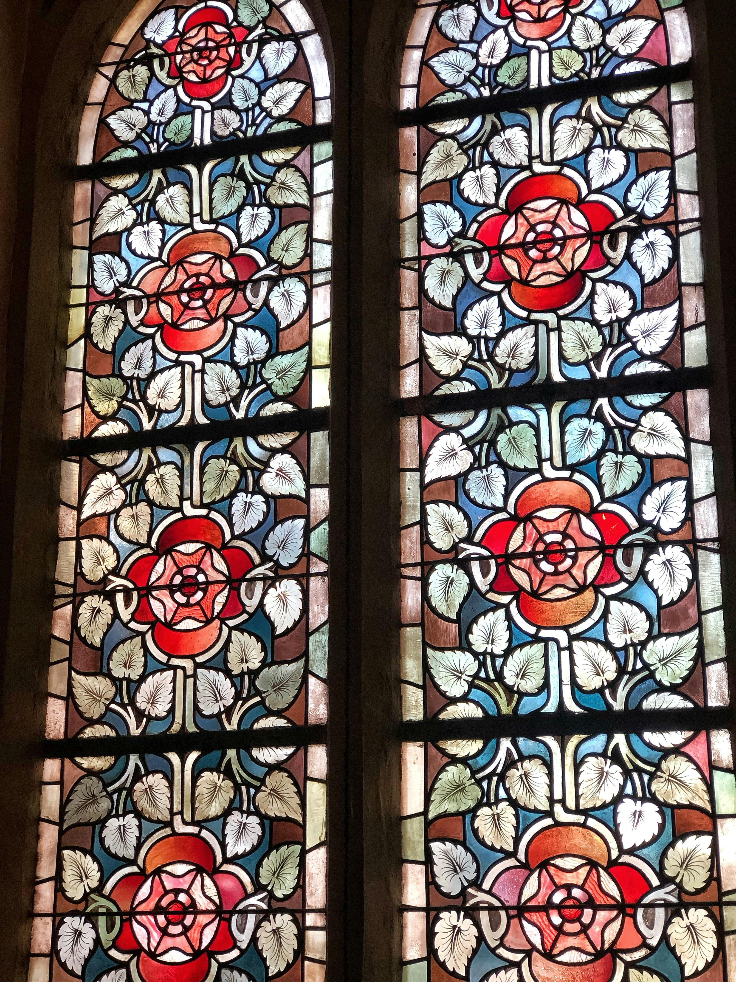 Close-Up Shot of a Stained Glass Window · Free Stock Photo