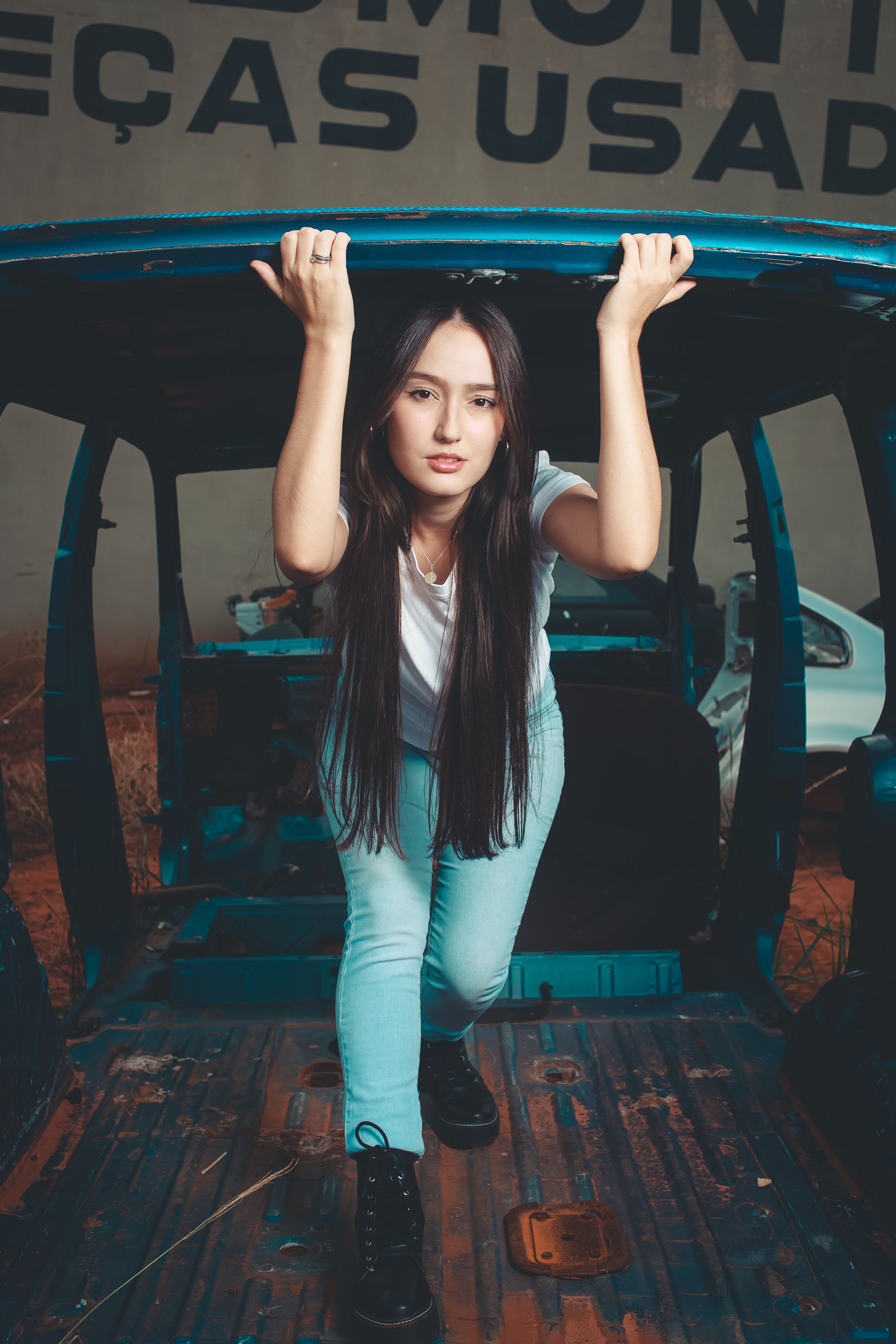 Woman Posing on Vehicle · Free Stock Photo