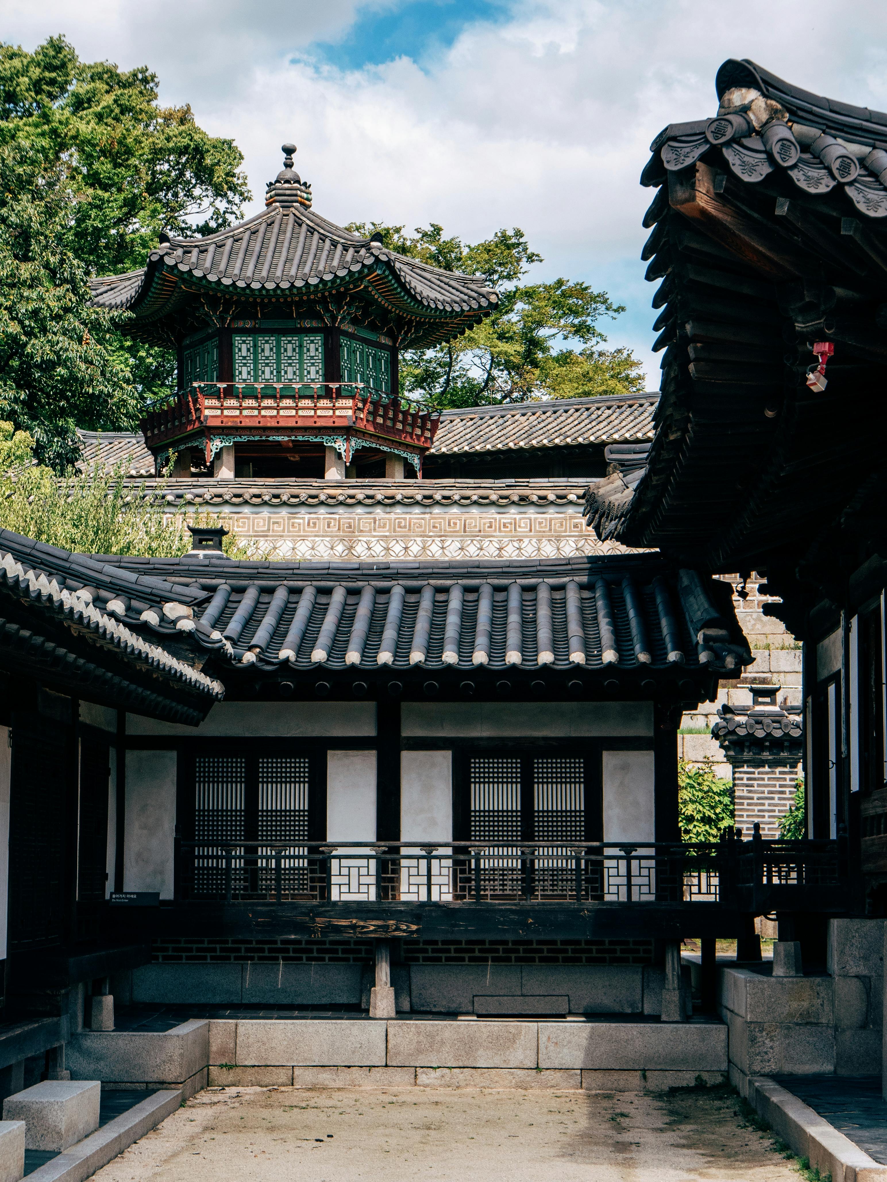 Woman Selling Traditional Asian Scripts · Free Stock Photo
