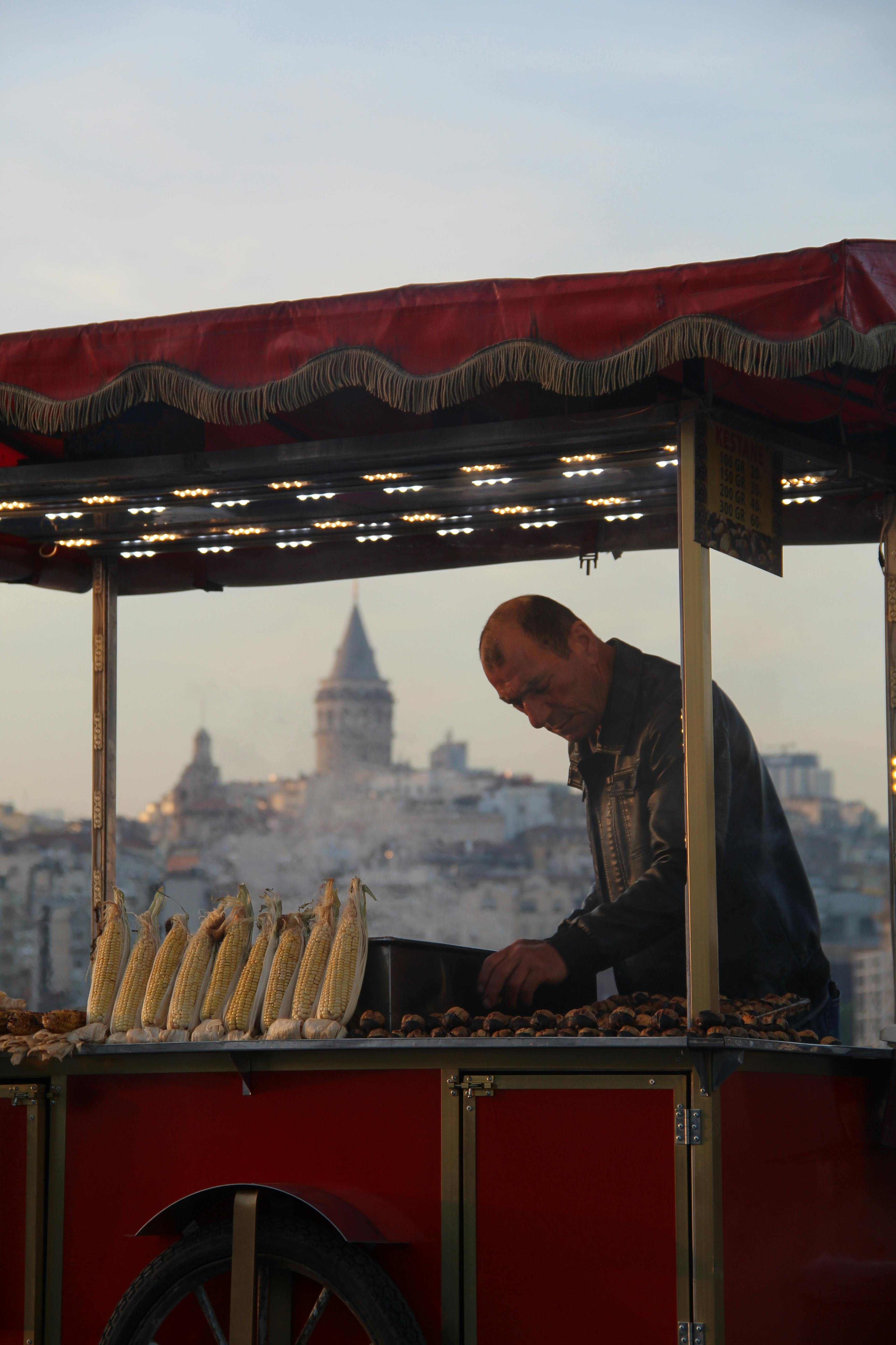 Street Vendor Selling Popcorn · Free Stock Photo