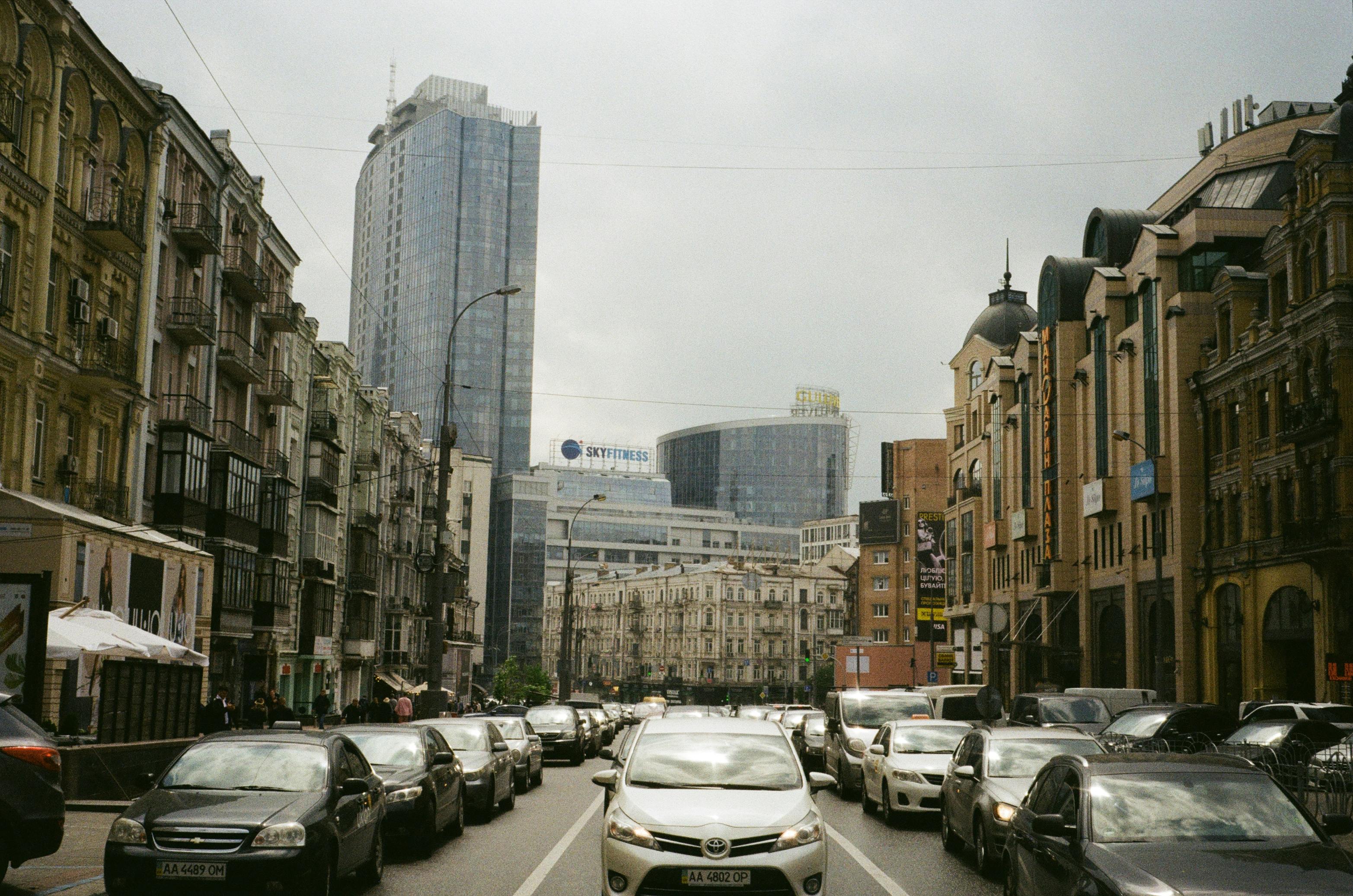 Heavy Traffic on the Road Between City Buildings · Free Stock Photo