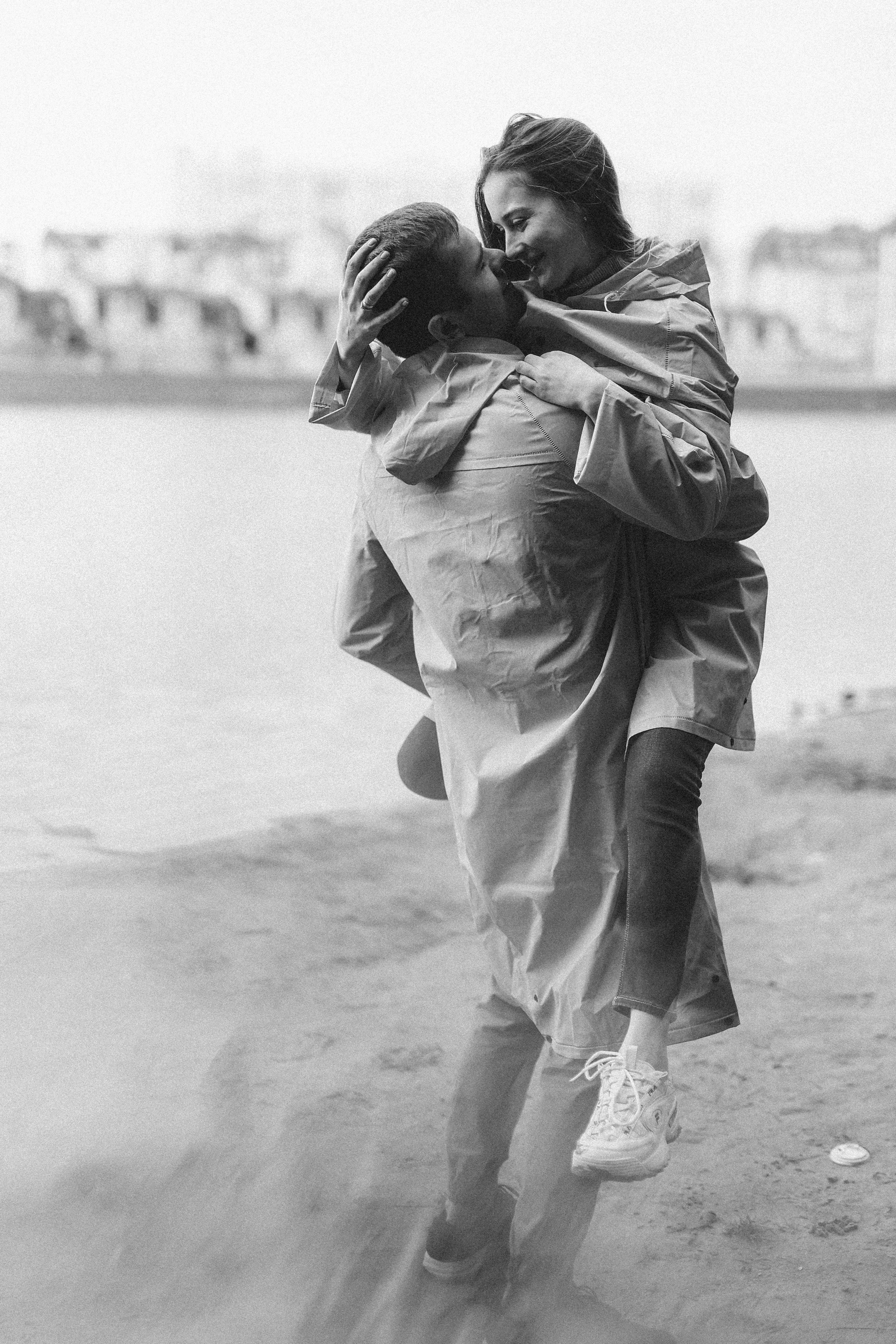 Man Picking Up and Hugging Girlfriend · Free Stock Photo