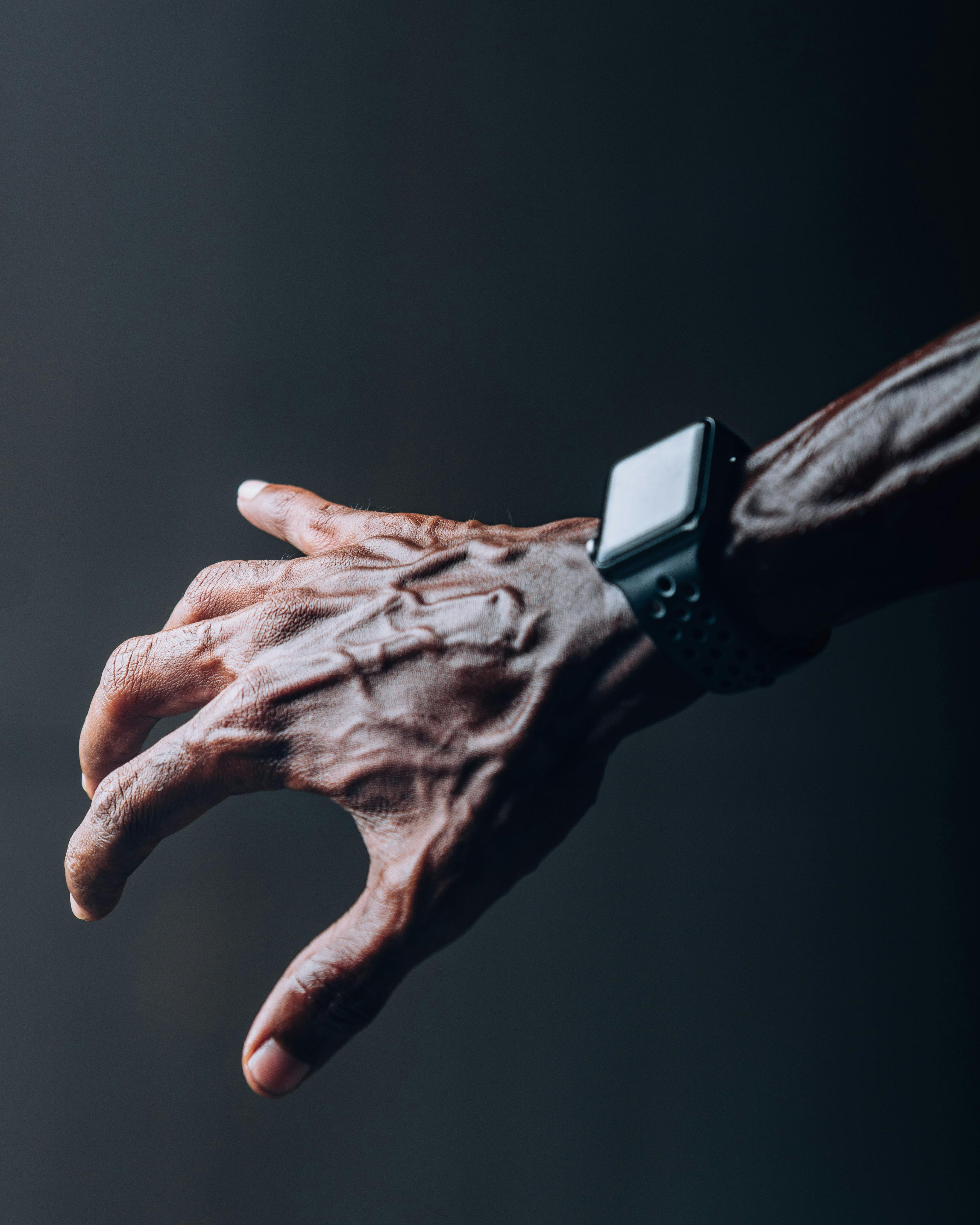 Person Wearing Black Smartwatch · Free Stock Photo