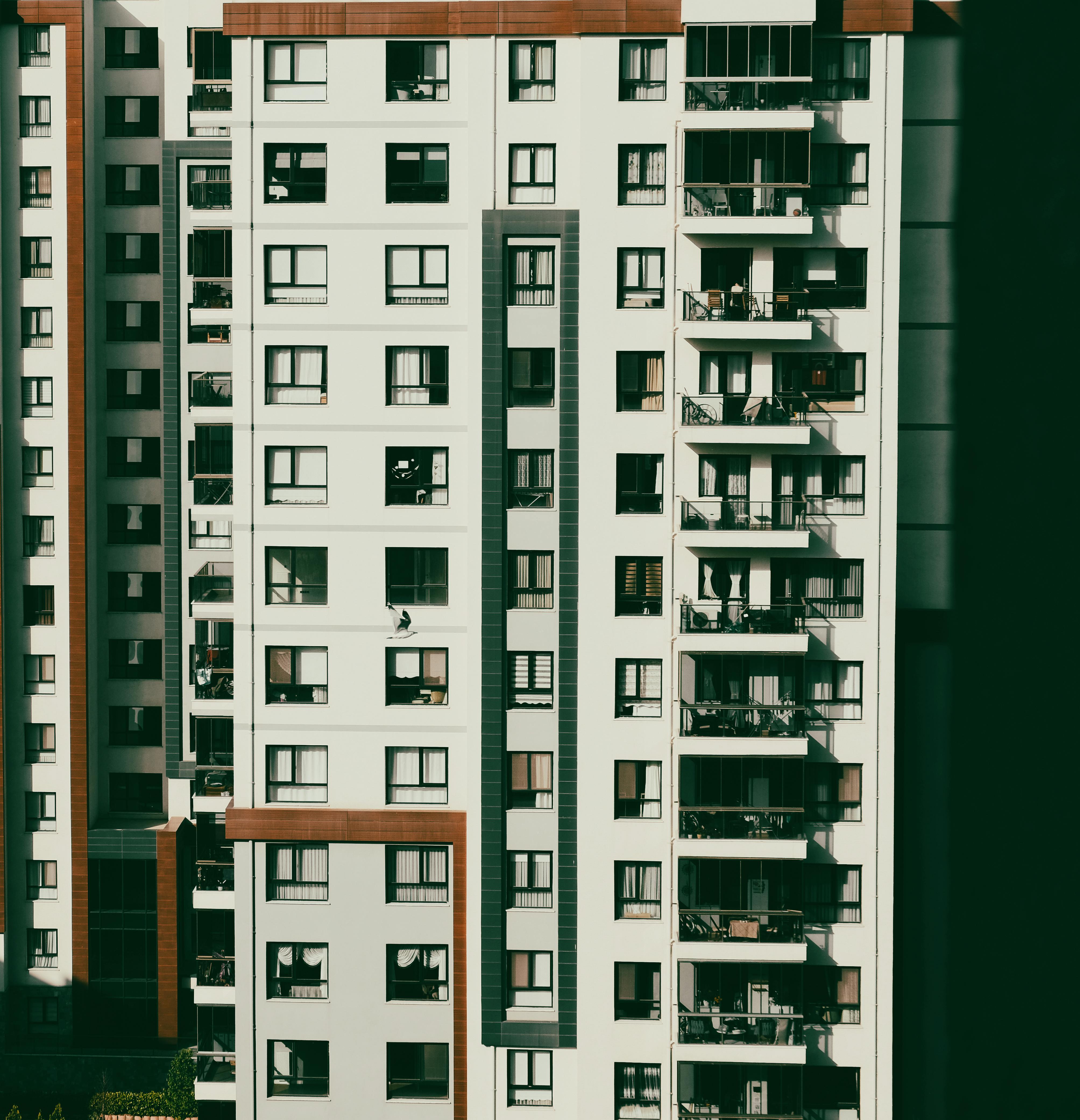 Photo of a Balcony of a Brick Building · Free Stock Photo