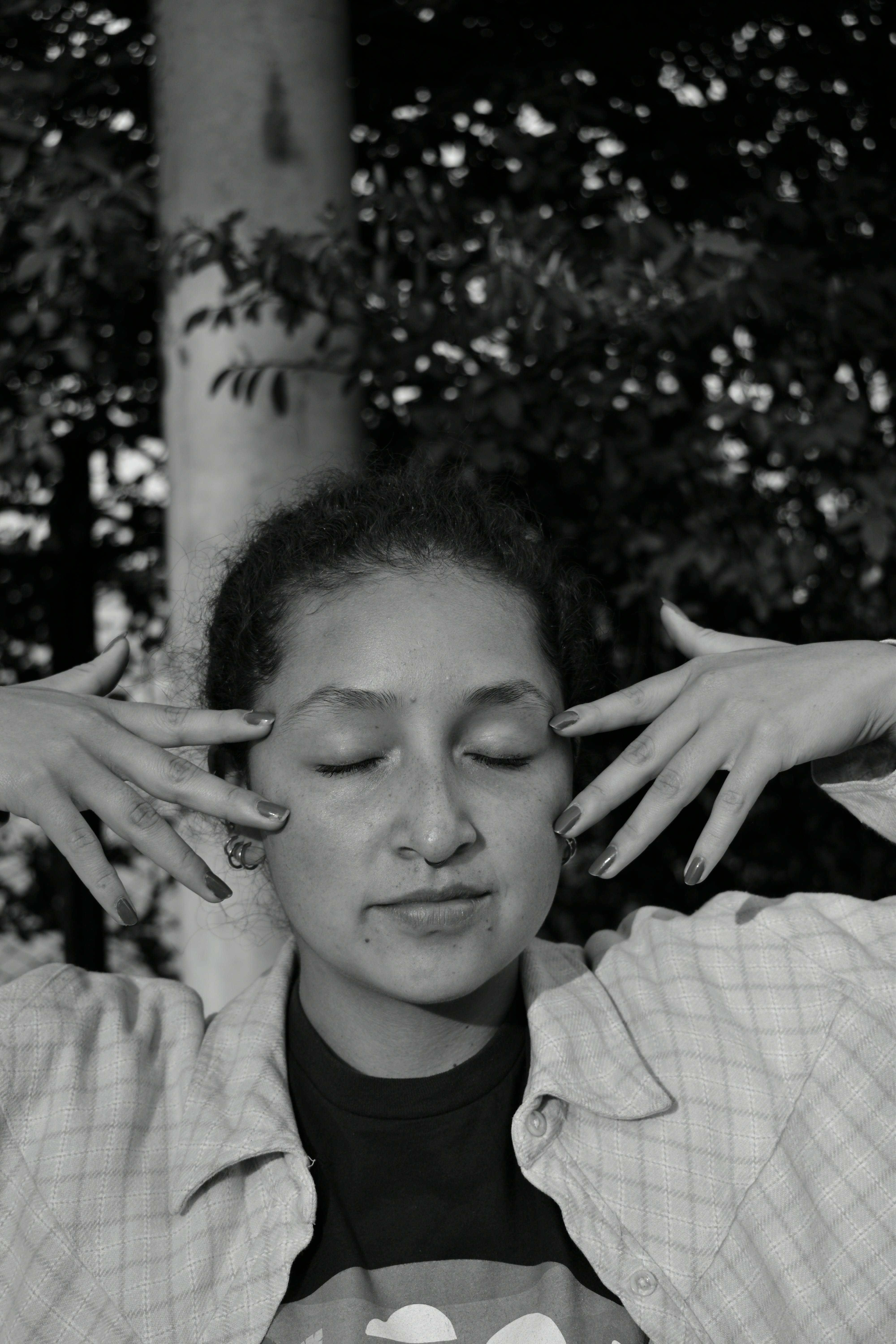 Grayscale Photo of a Woman Pointing in Front · Free Stock Photo