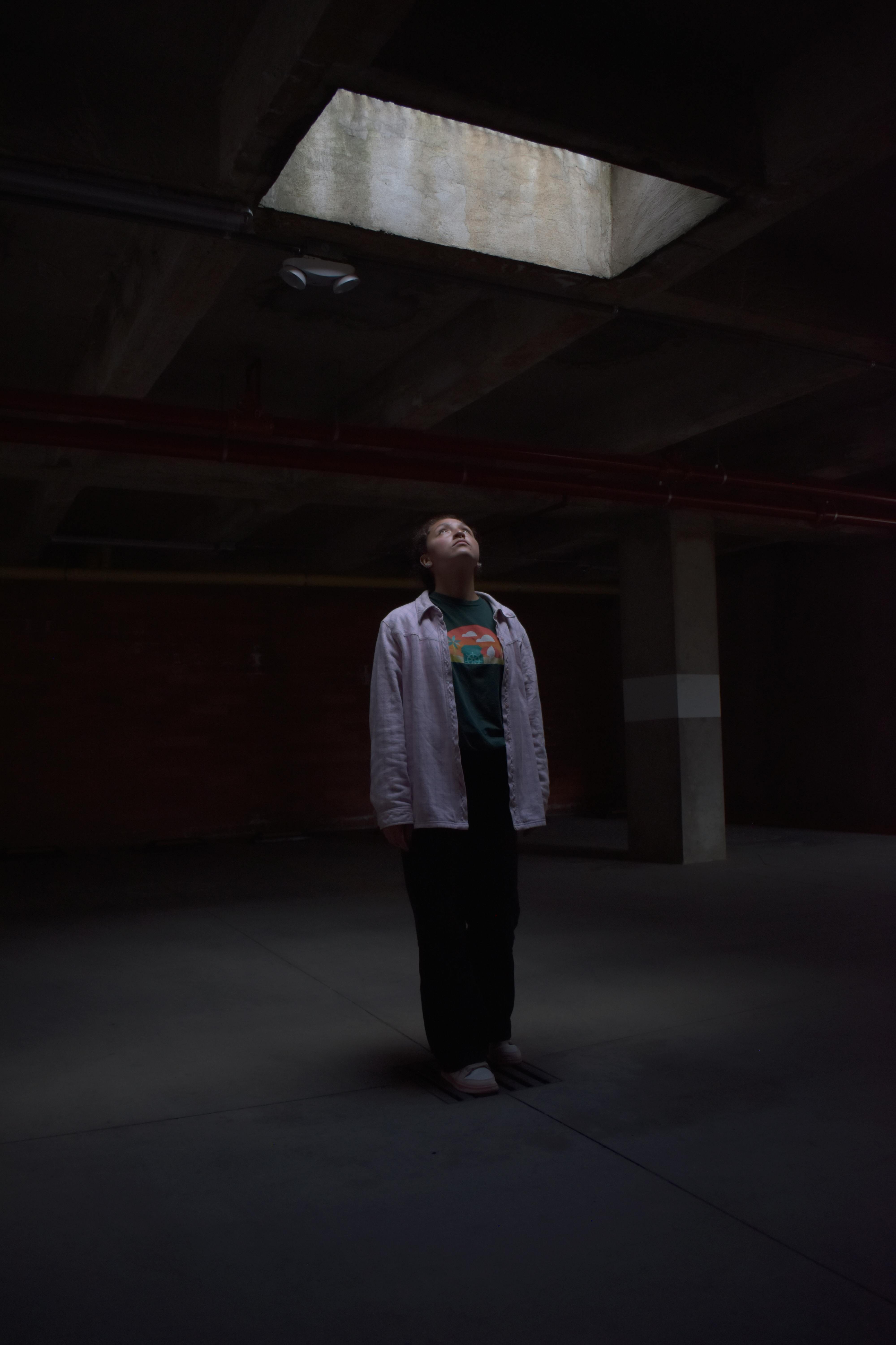 Person looking up in an Opened Ceiling · Free Stock Photo