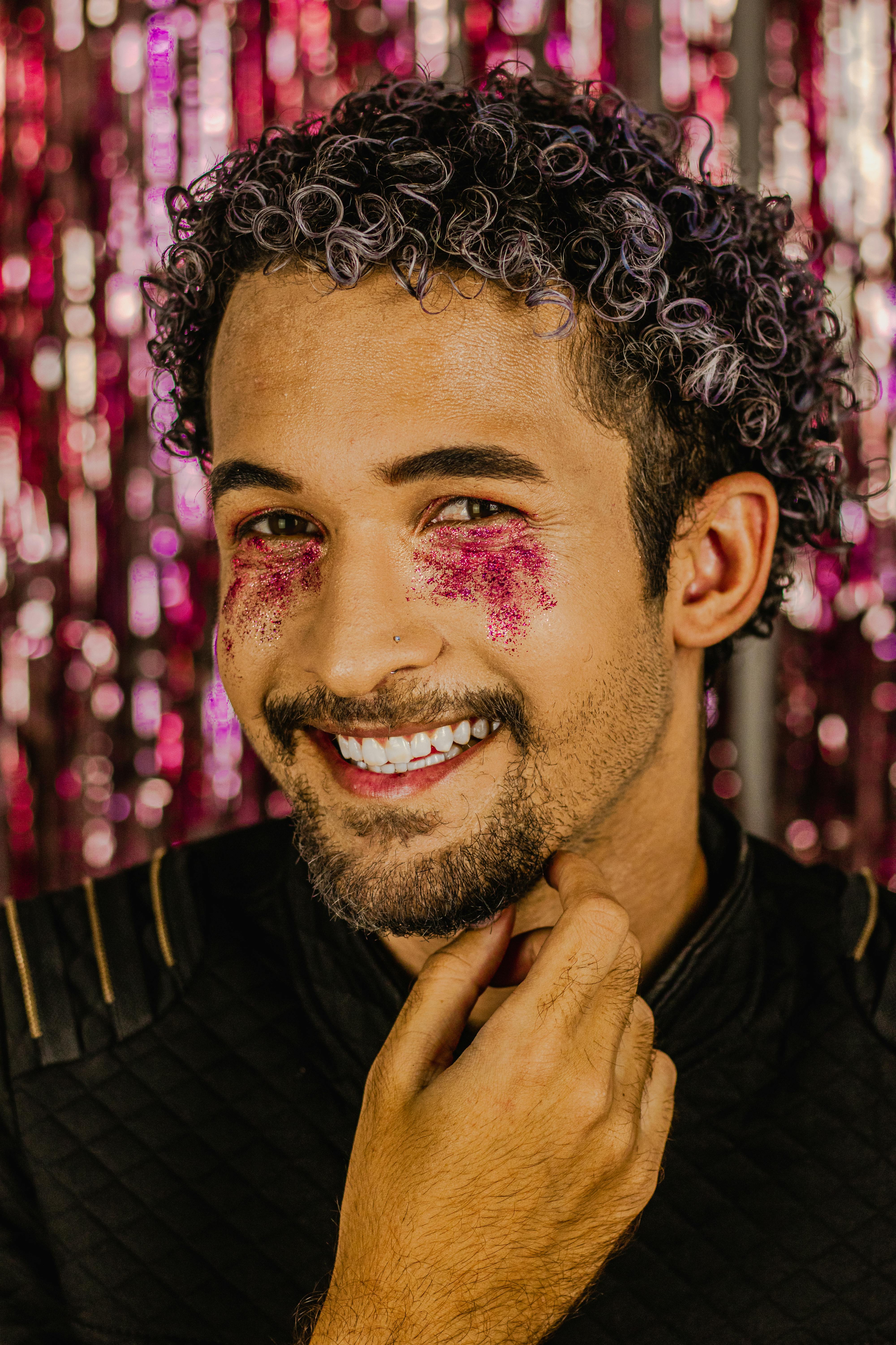 Close-up Photo of Happy Man with Pink Glitters under his Eyes · Free ...