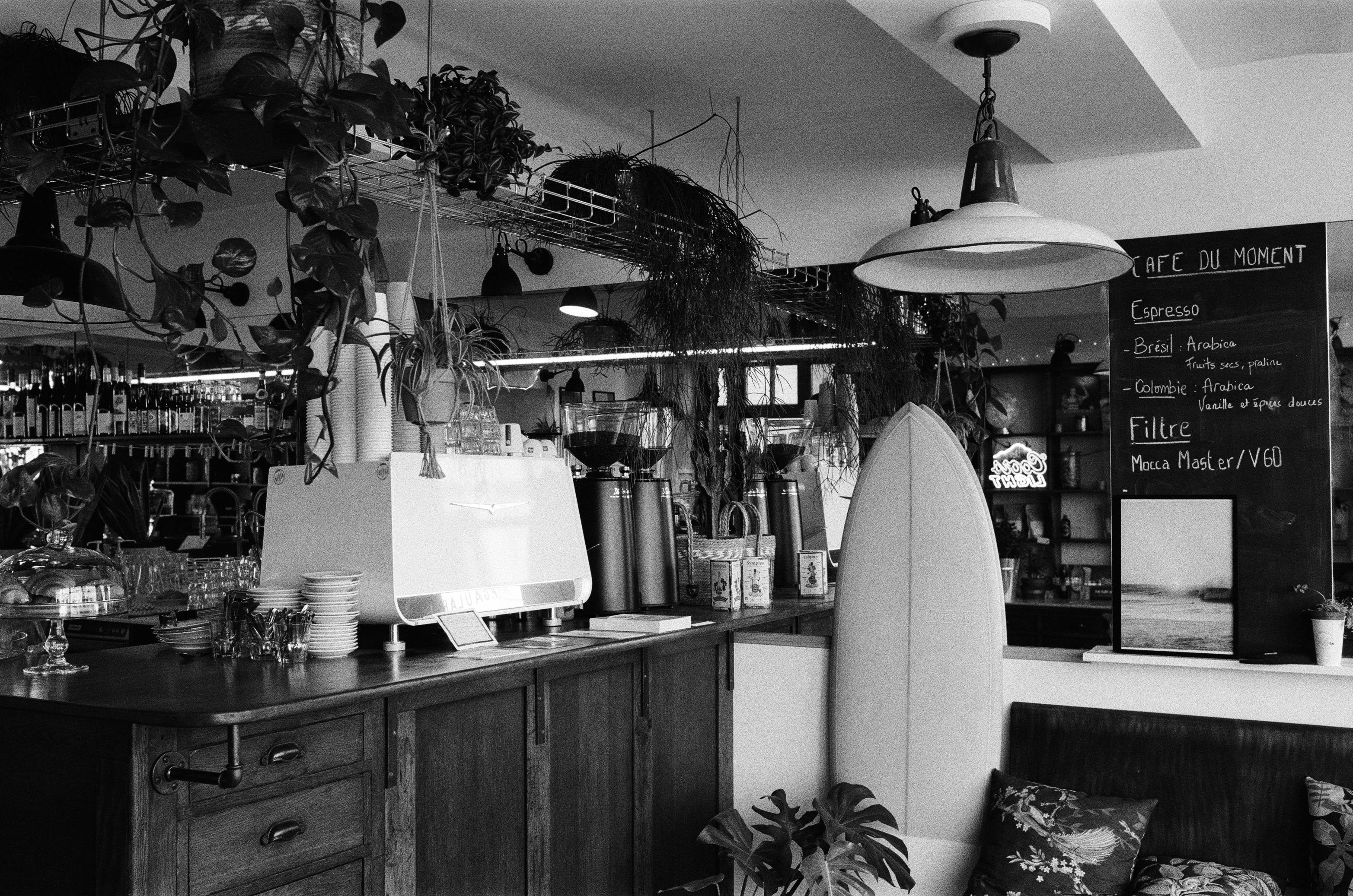 Grayscale Photography Of Inside A Coffee Shop · Free Stock Photo