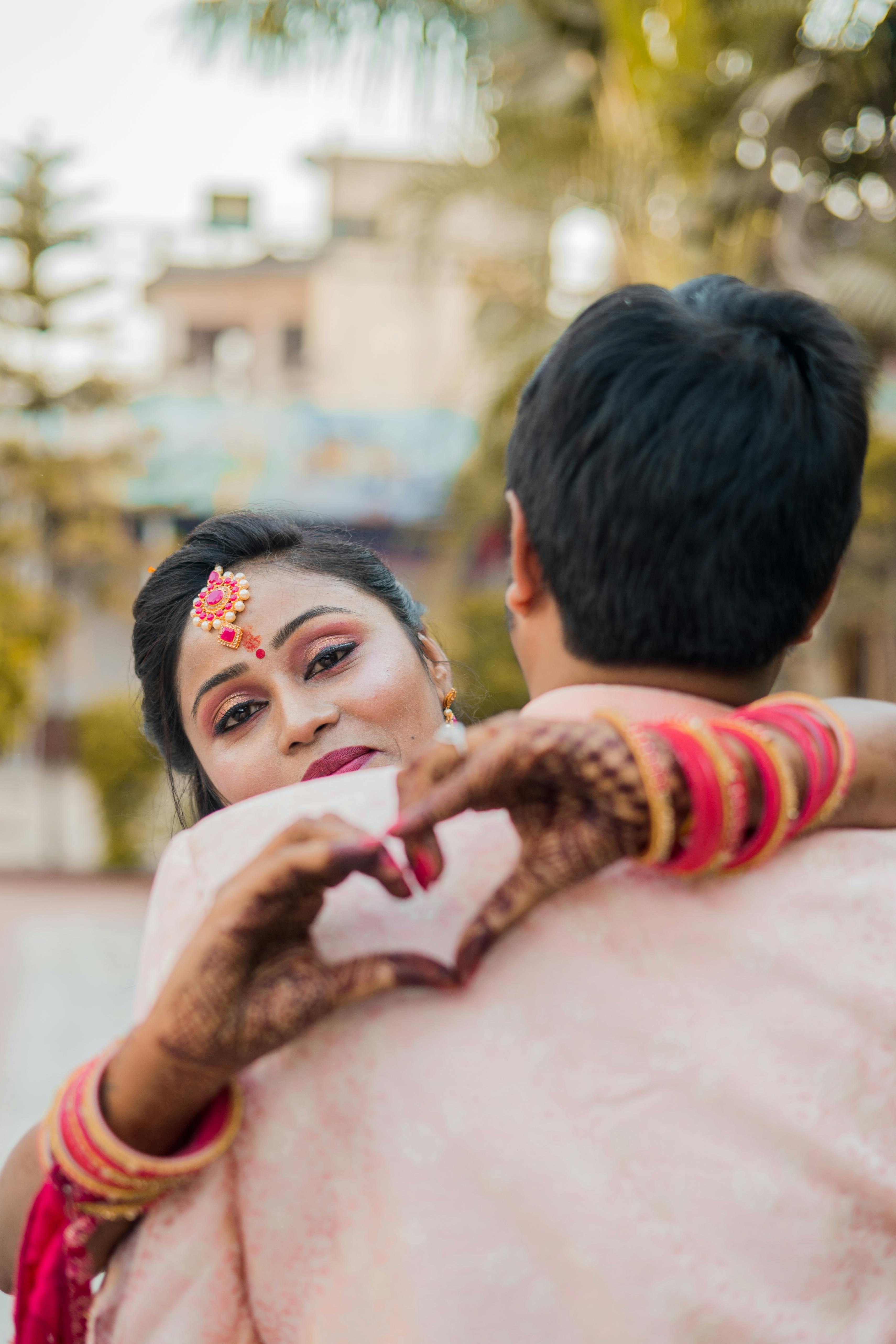 Heart-shaped Hand Gesture by Bride's Hands · Free Stock Photo