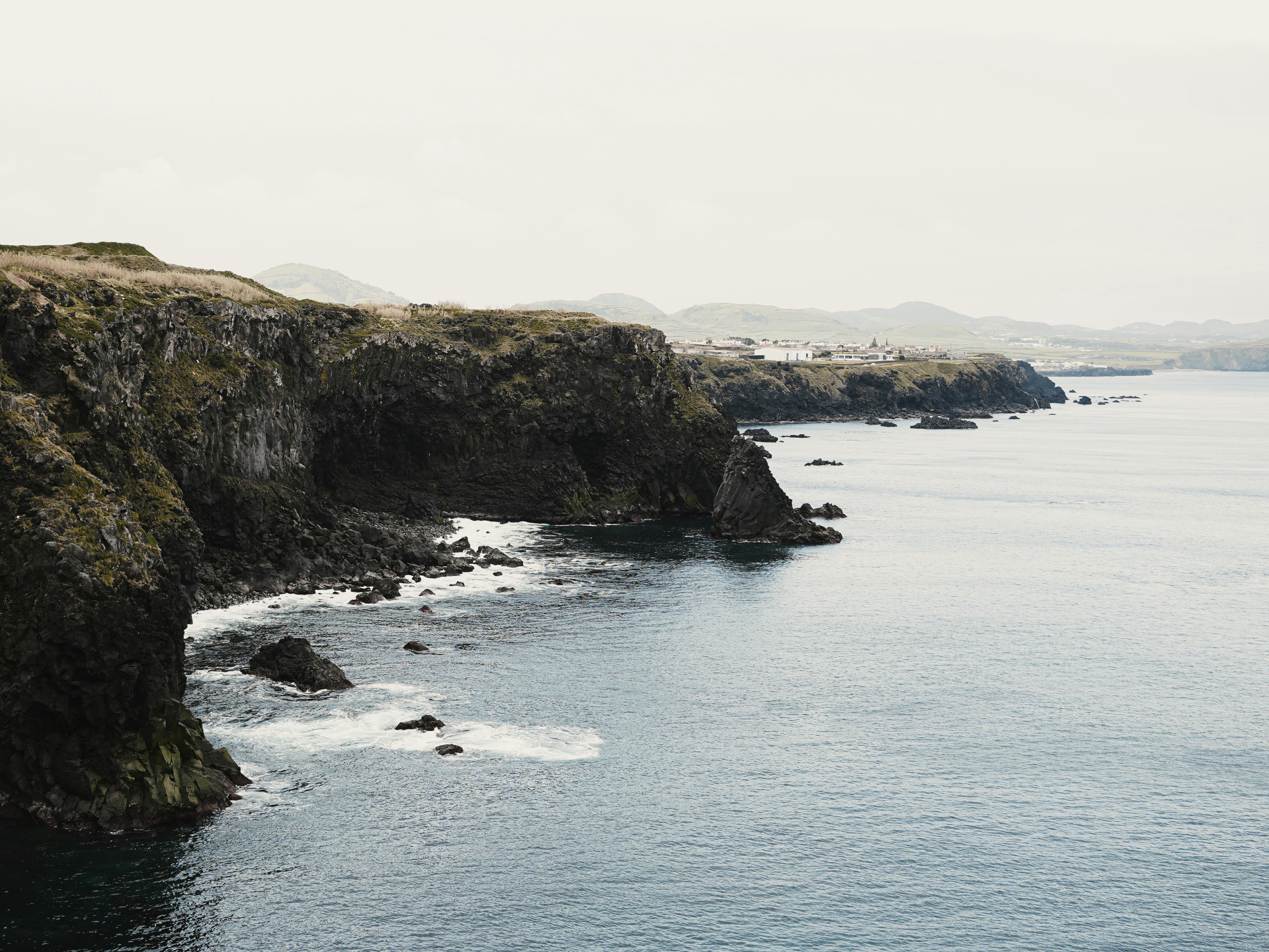 Rock Formation on Seacoast · Free Stock Photo