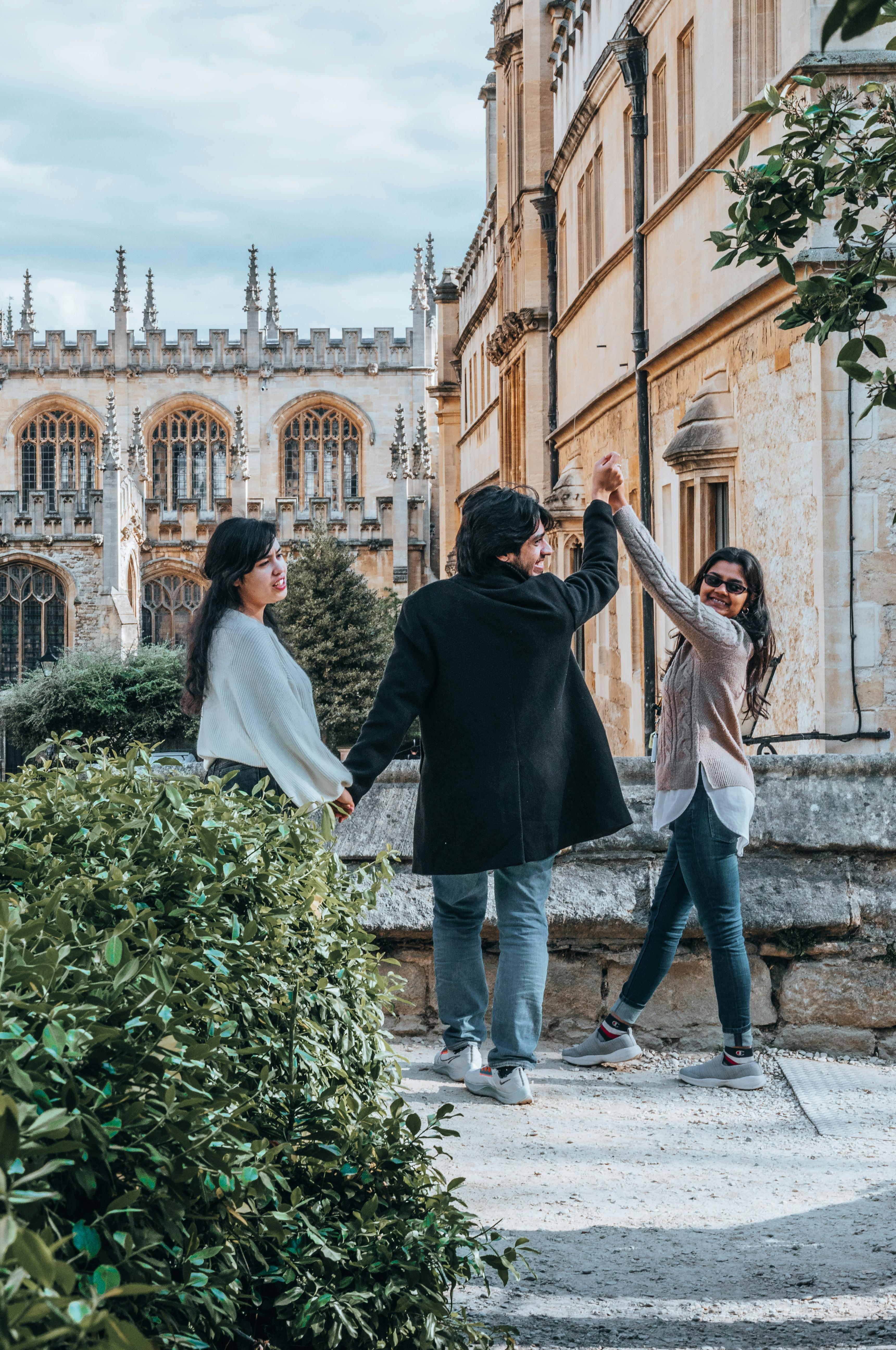 Friends Walking on the Street · Free Stock Photo