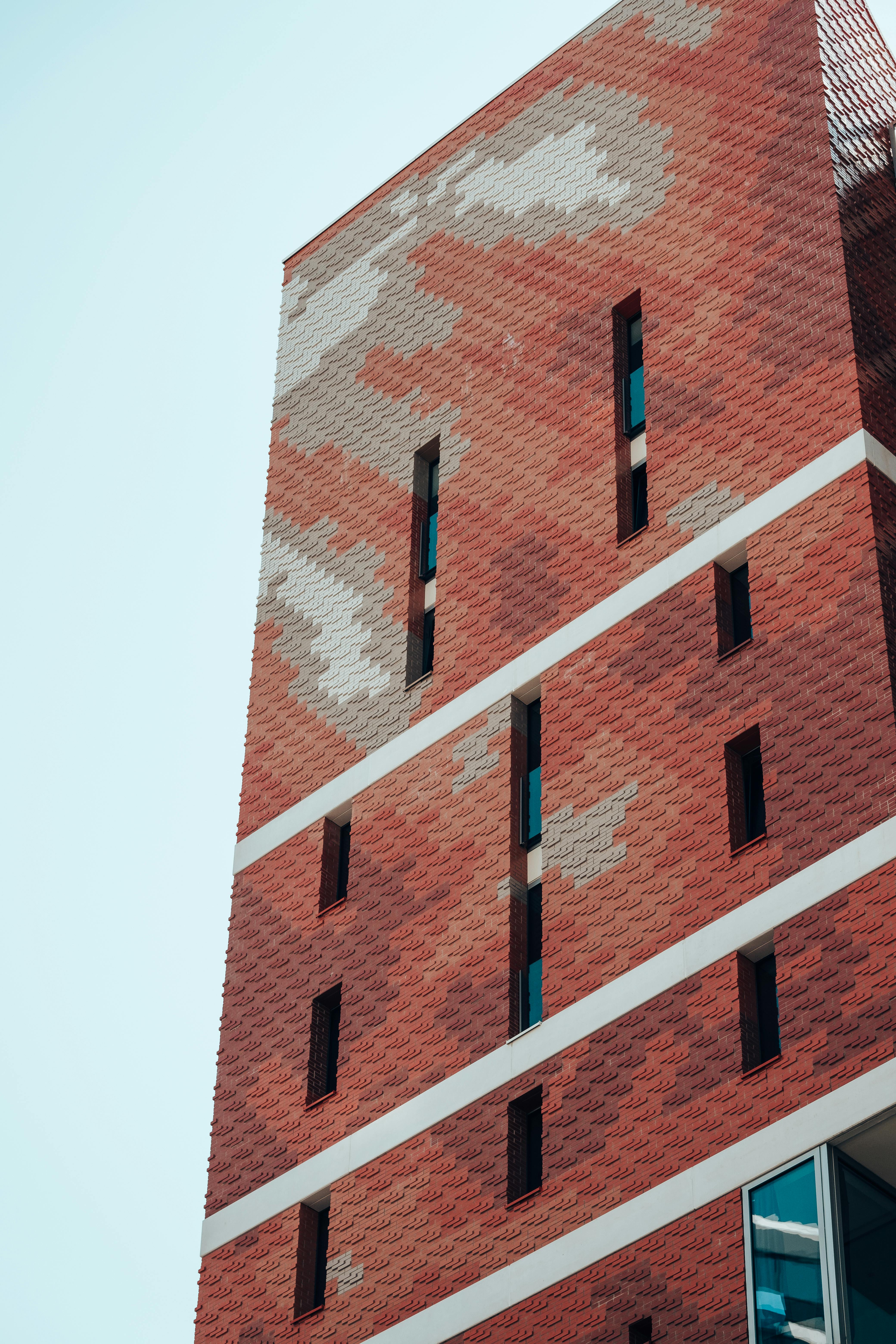 Low Angle Photography of a High-rise Building · Free Stock Photo