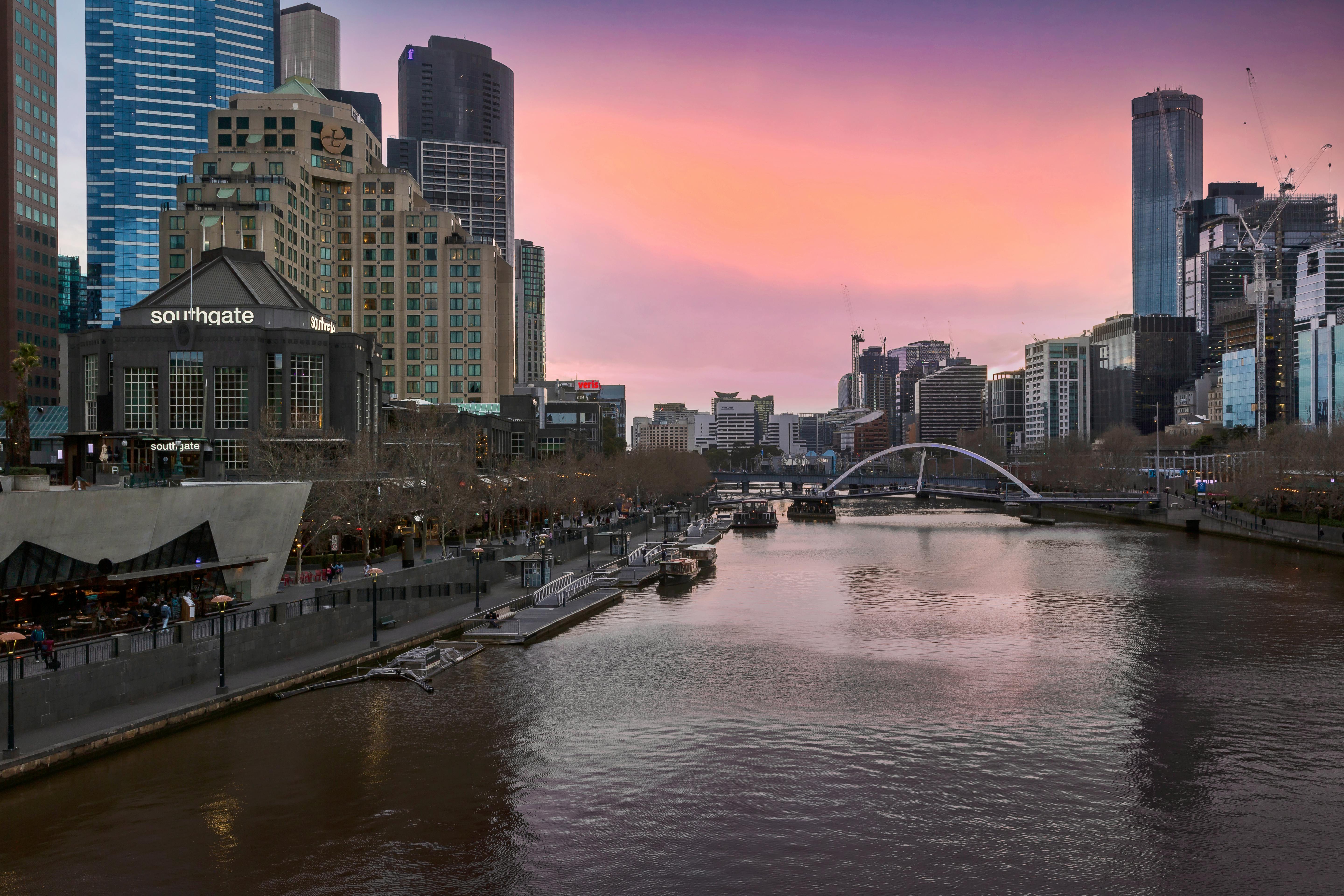 City Buildings Beside the River · Free Stock Photo