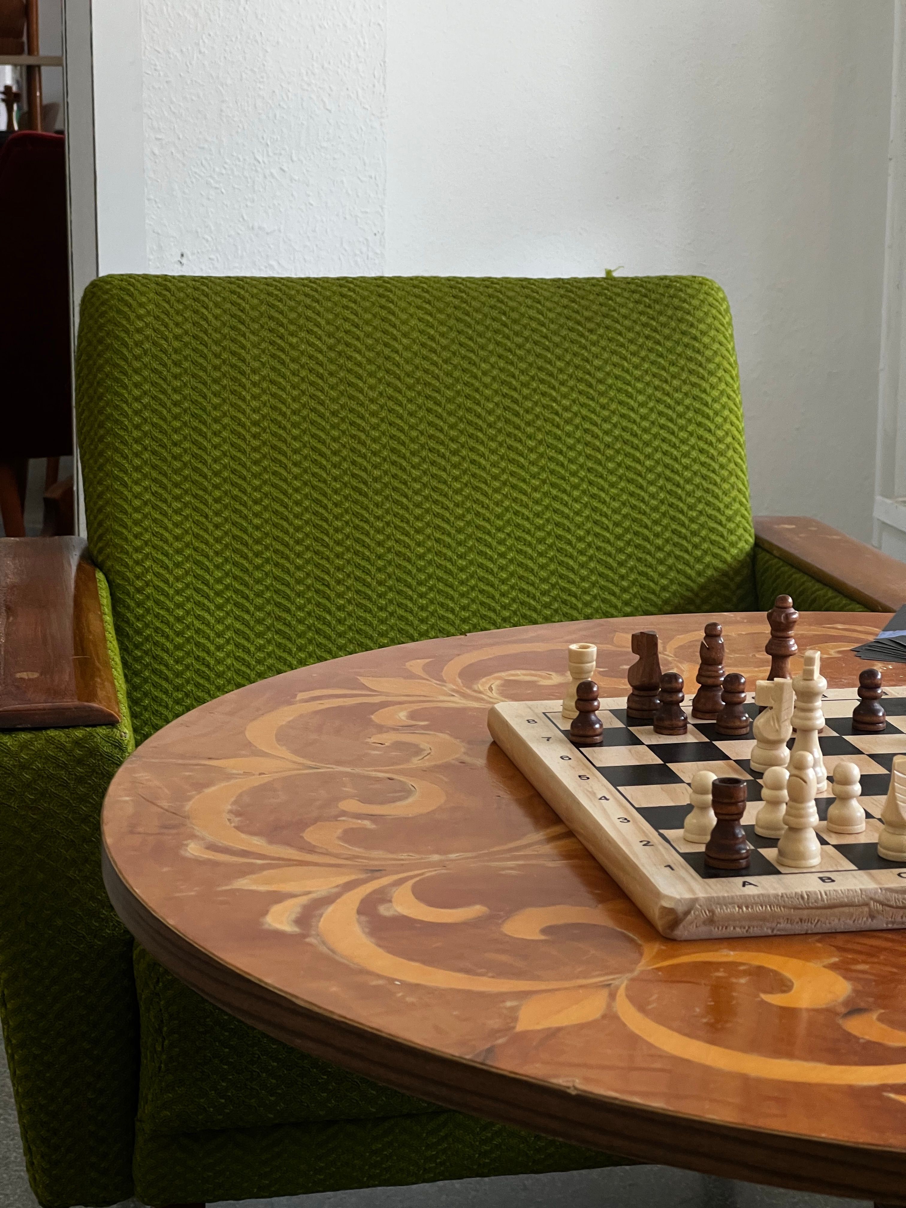 Chess Board on Wooden Table · Free Stock Photo