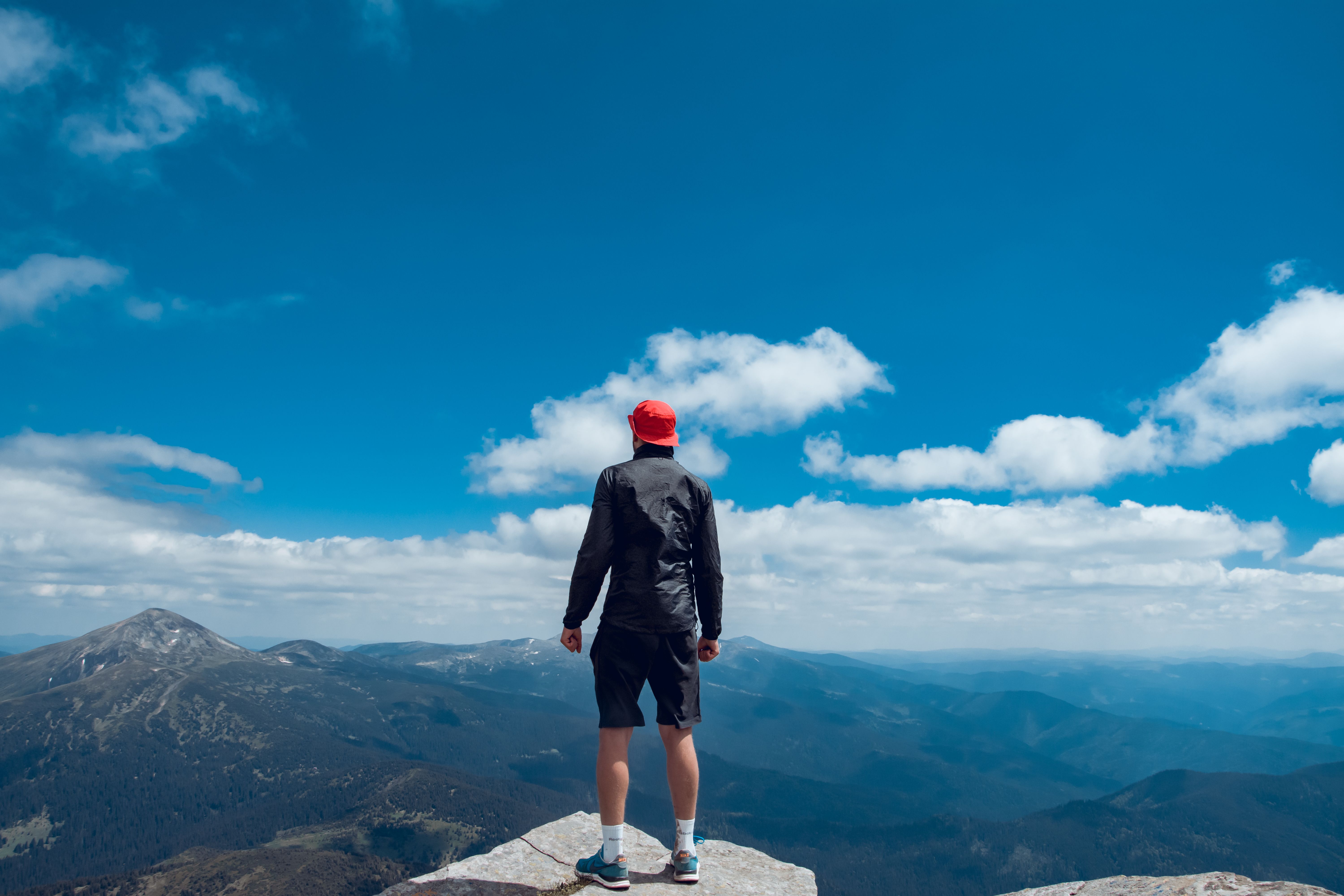 Backview of Man standing beside a River · Free Stock Photo