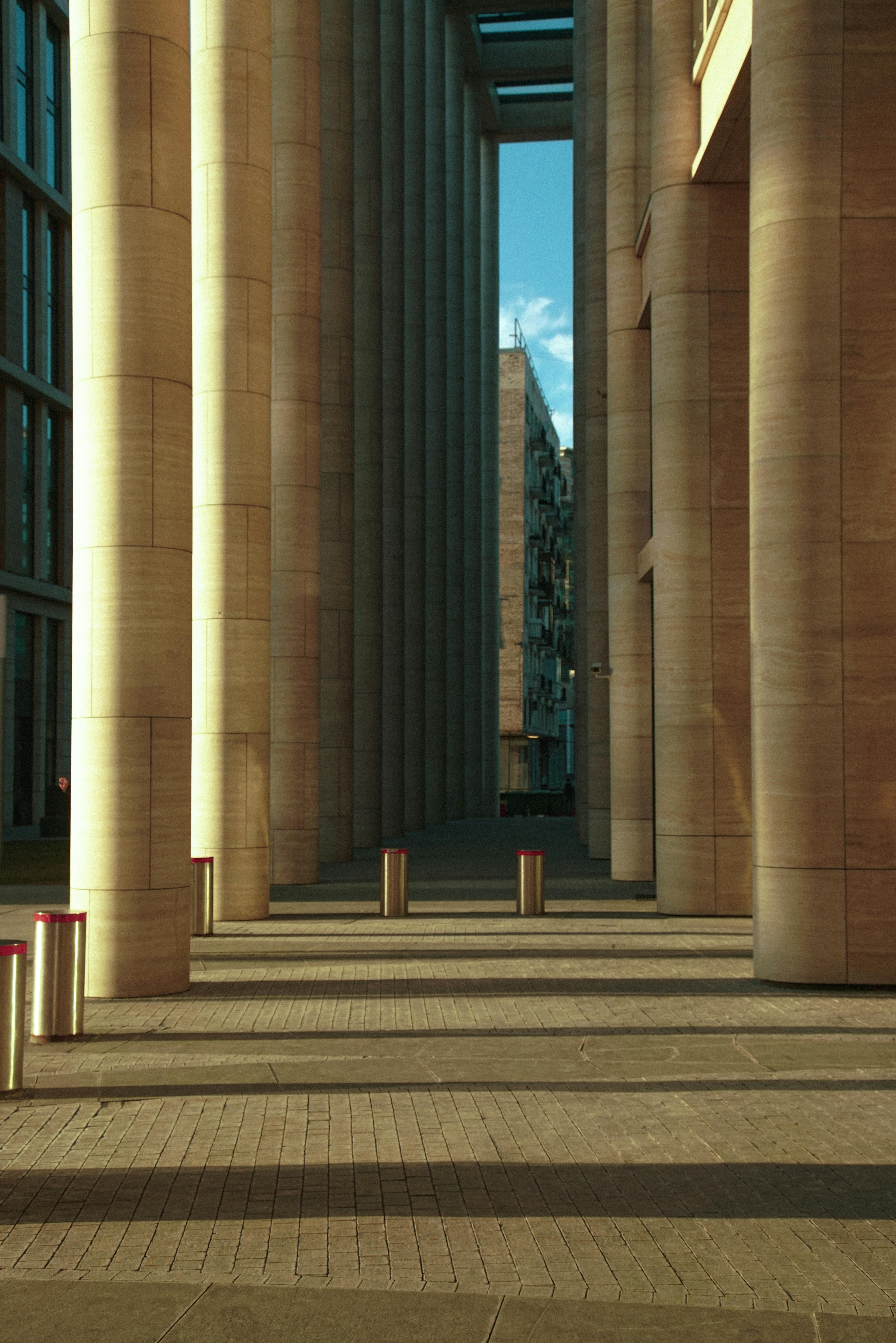 Modern Colonnade in Front of Office Buildings · Free Stock Photo