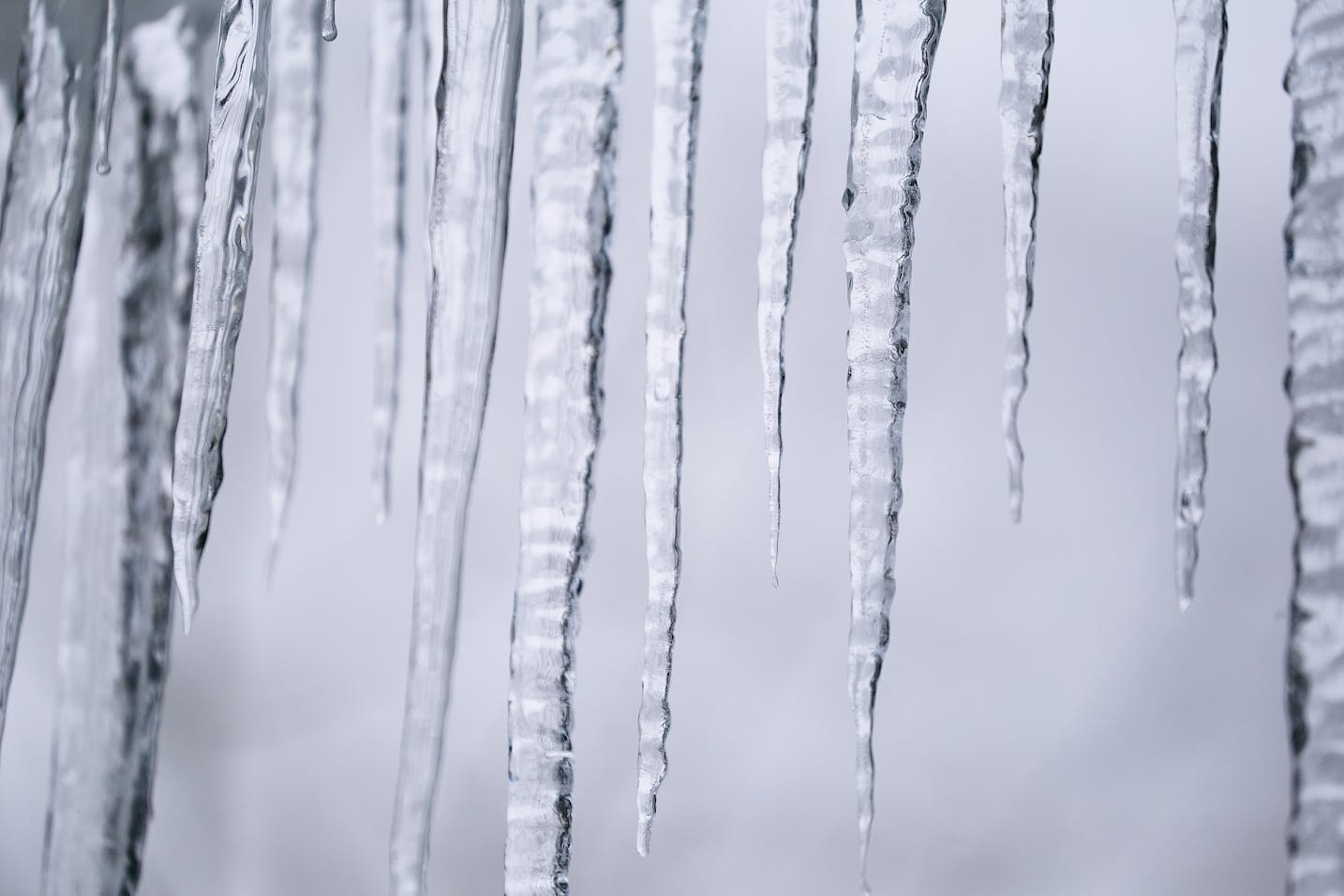 Why Do Icicles Form on My Roof and Ice Dams Explained