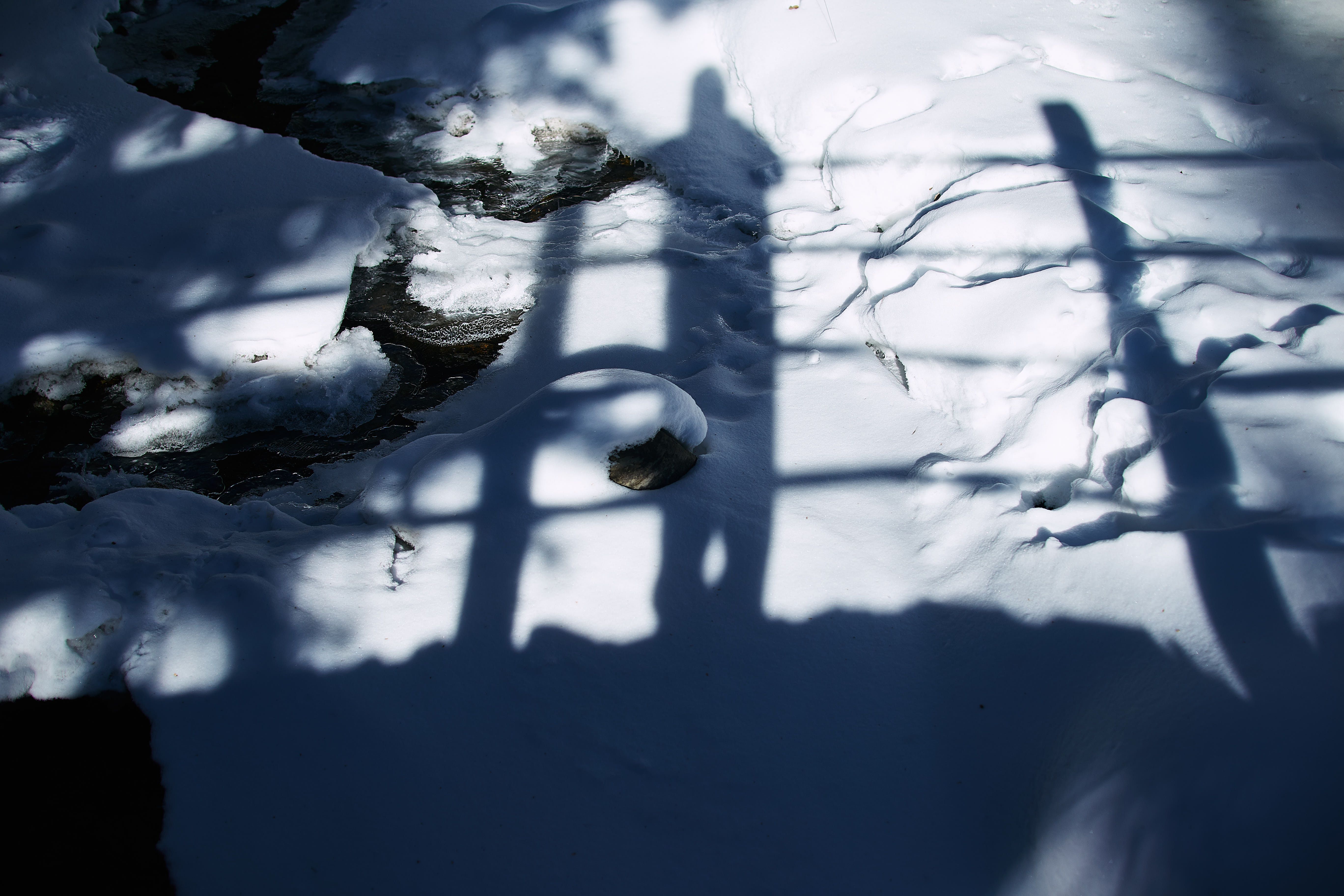 Umbrella Ribs Shadow on Ground · Free Stock Photo
